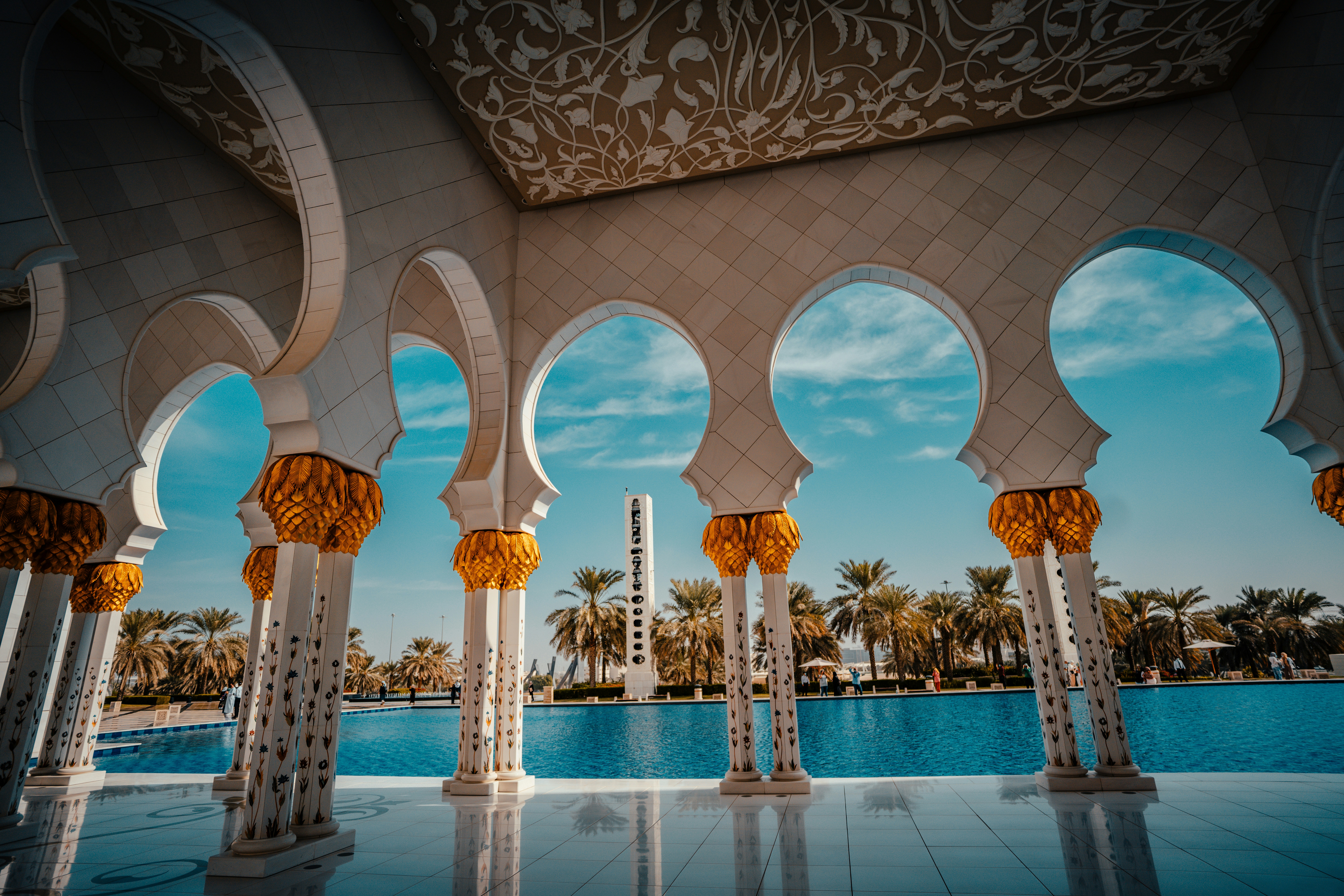 A view of a pool with arches and pillars photo – Free Sheikh zayed ...