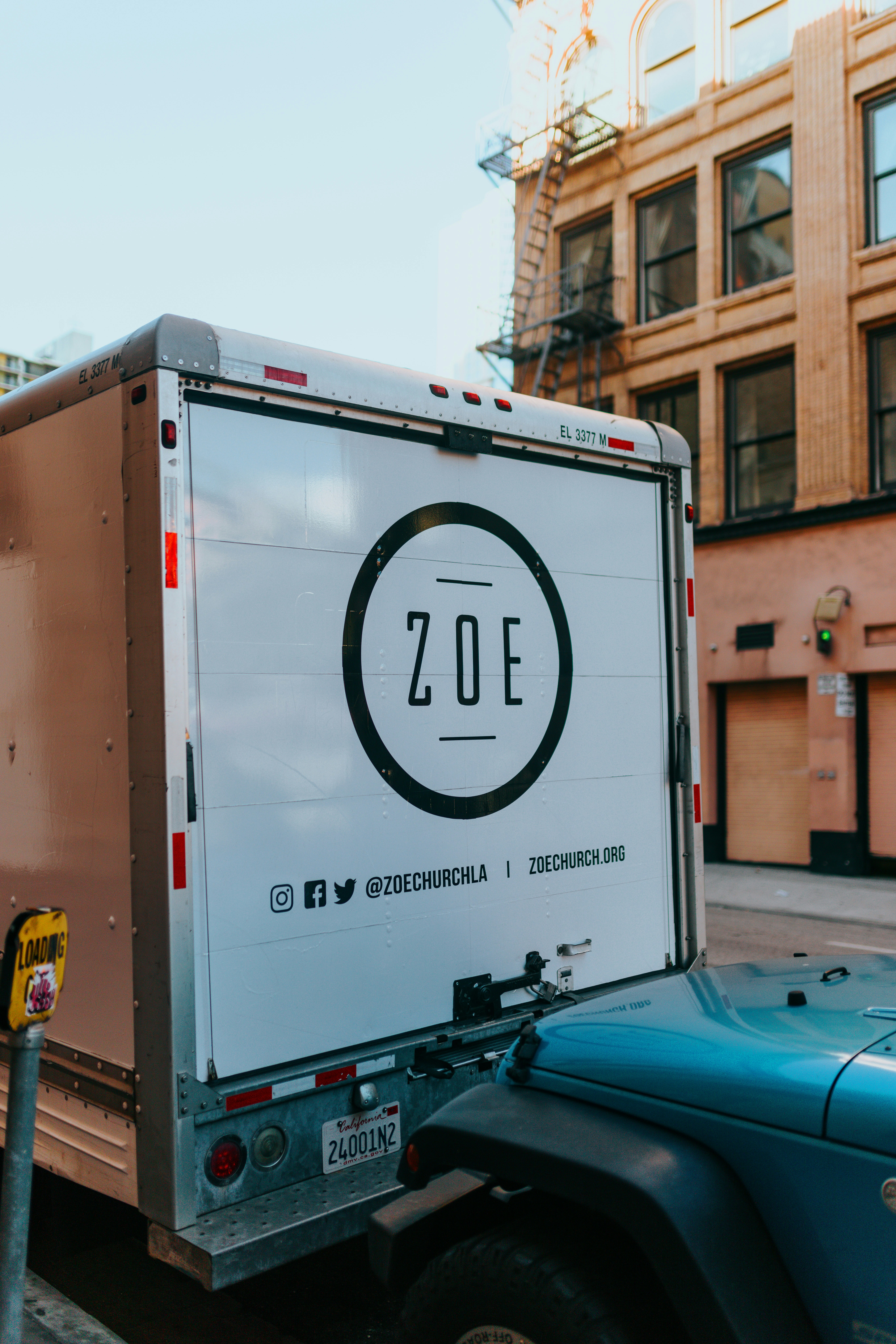 a truck is parked on the side of the road
