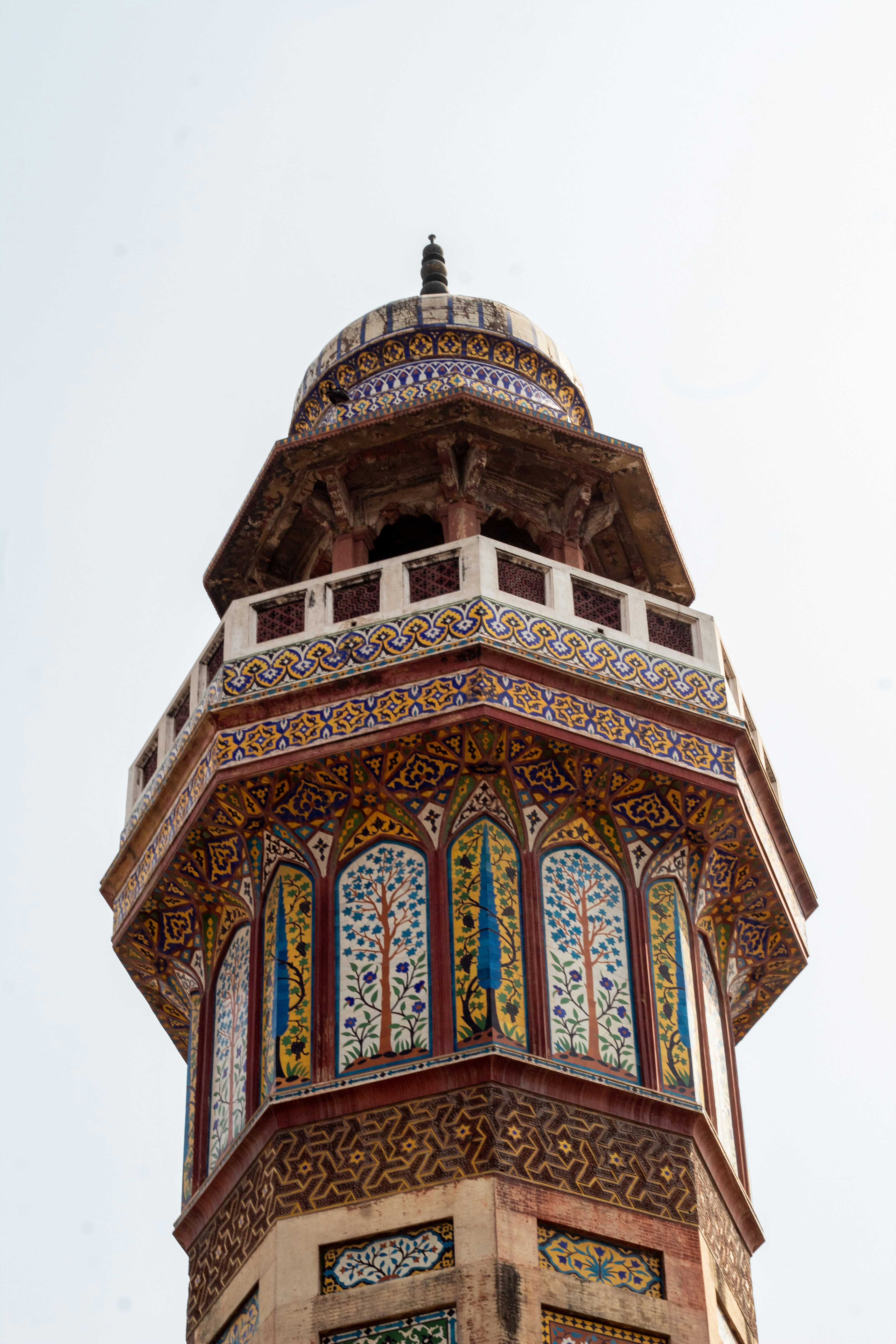 Intricate patterns and vibrant colors adorn the tower, showcasing exquisite craftsmanship and historical significance.