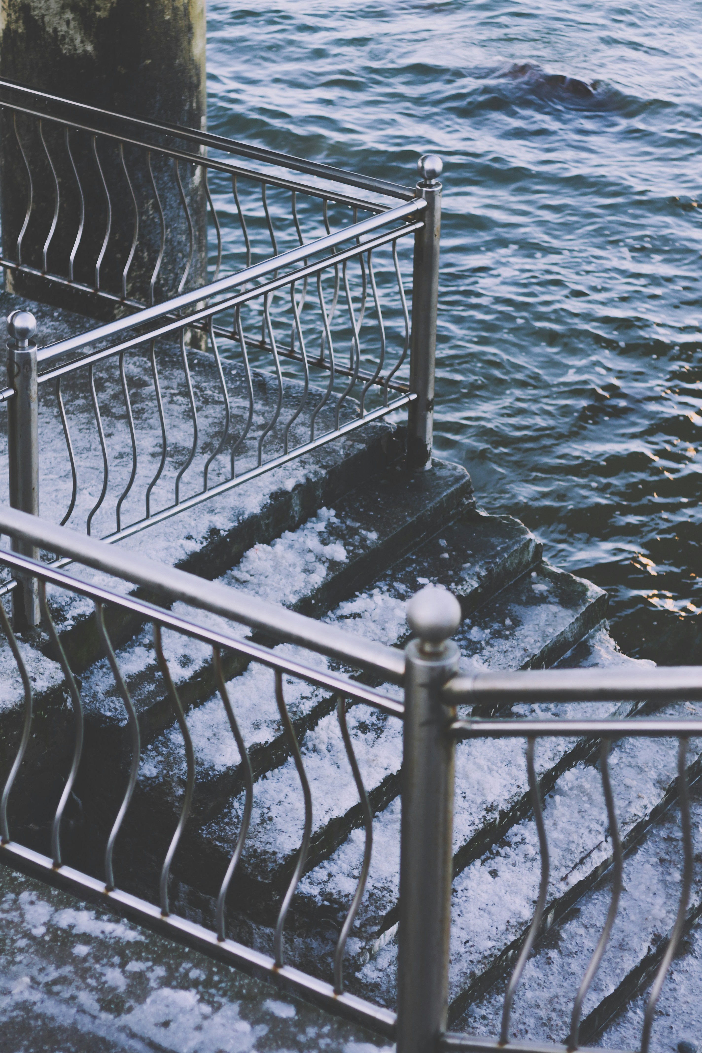 Staircase Railings Framing a Winter Waterfront