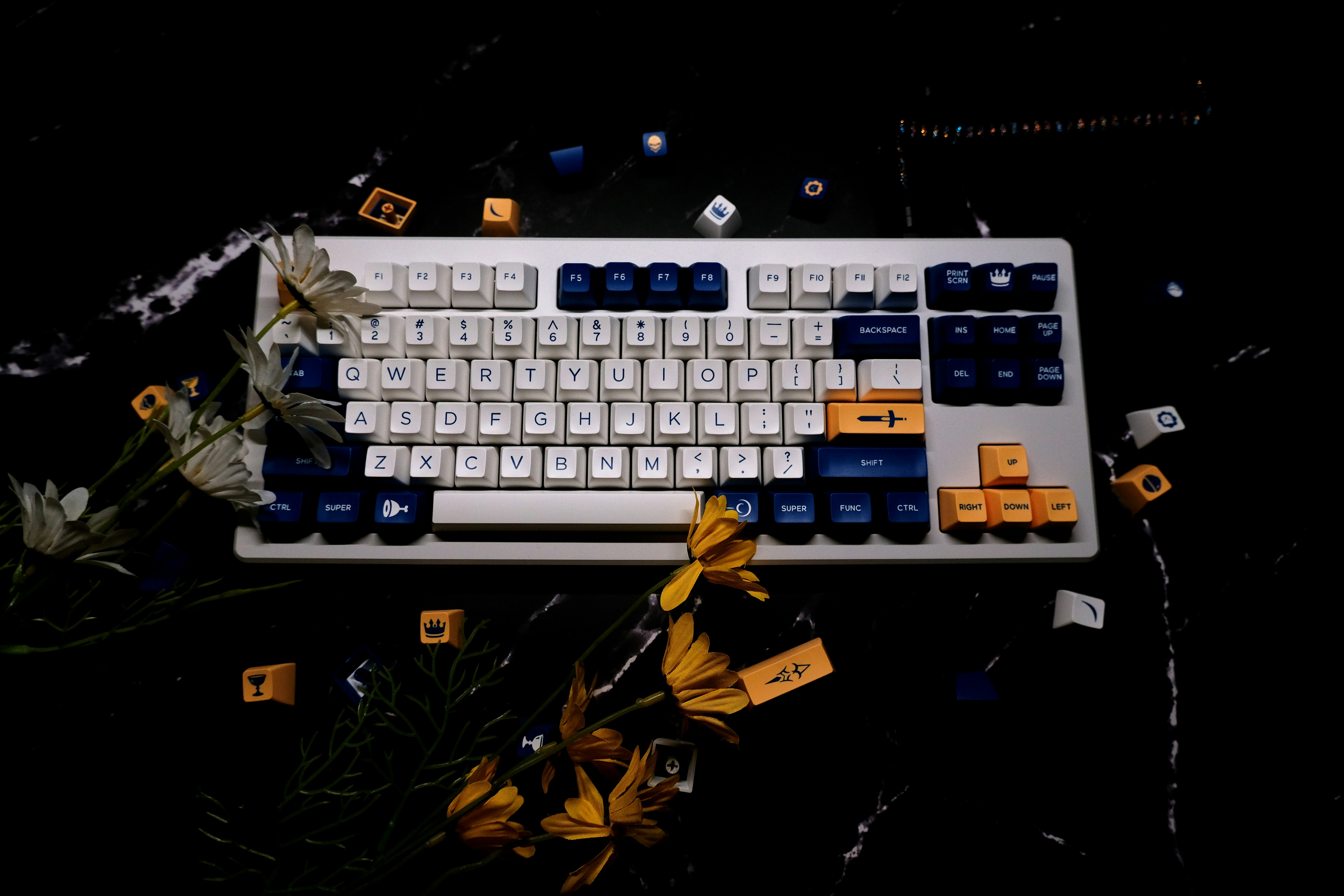Mechanical keyboard surrounded by vibrant flowers and colorful keycaps, creating a harmonious blend of technology and nature.