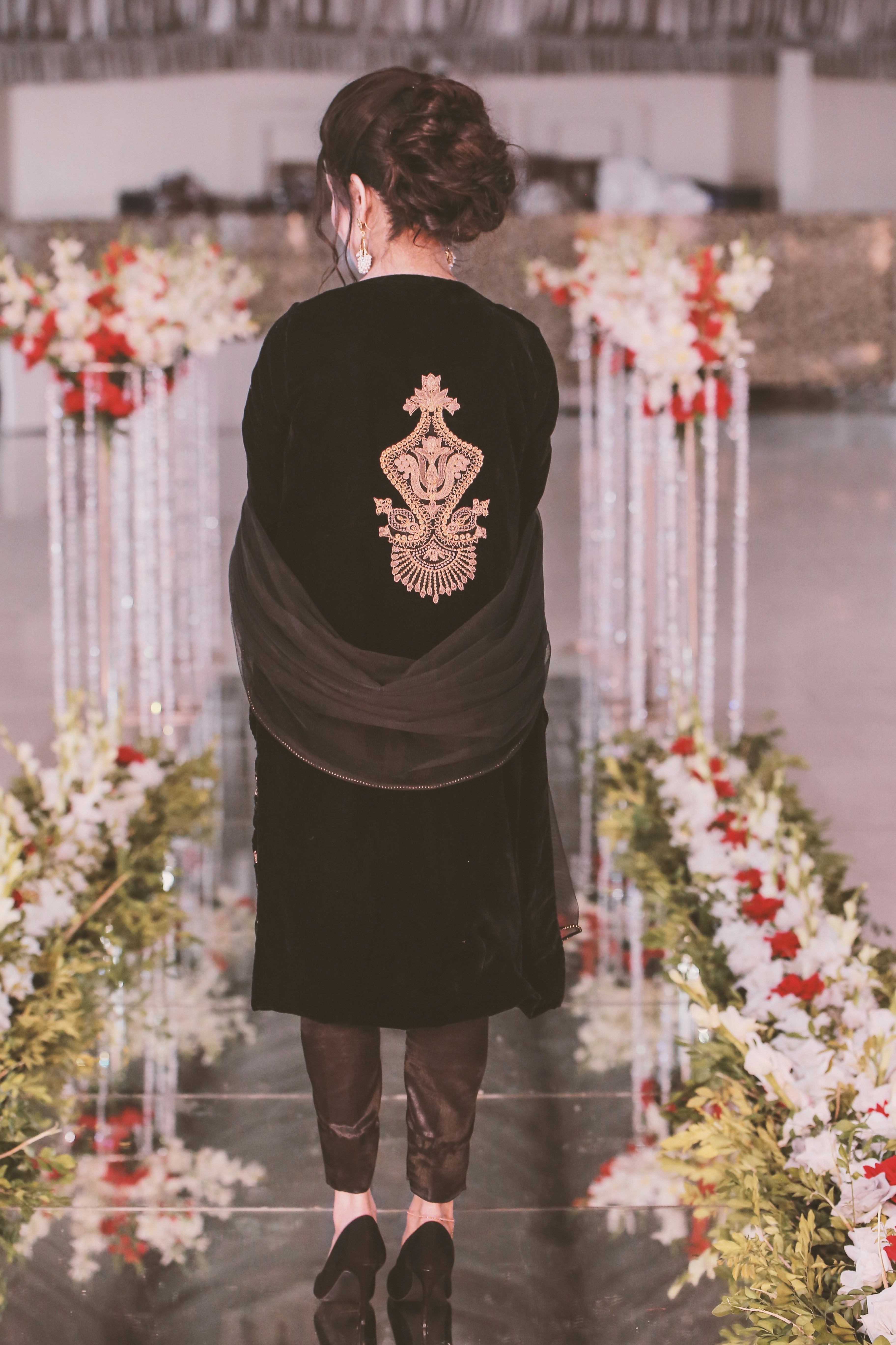 Embroidered Back in Black: A Solemn Walk Down a Floral Runway