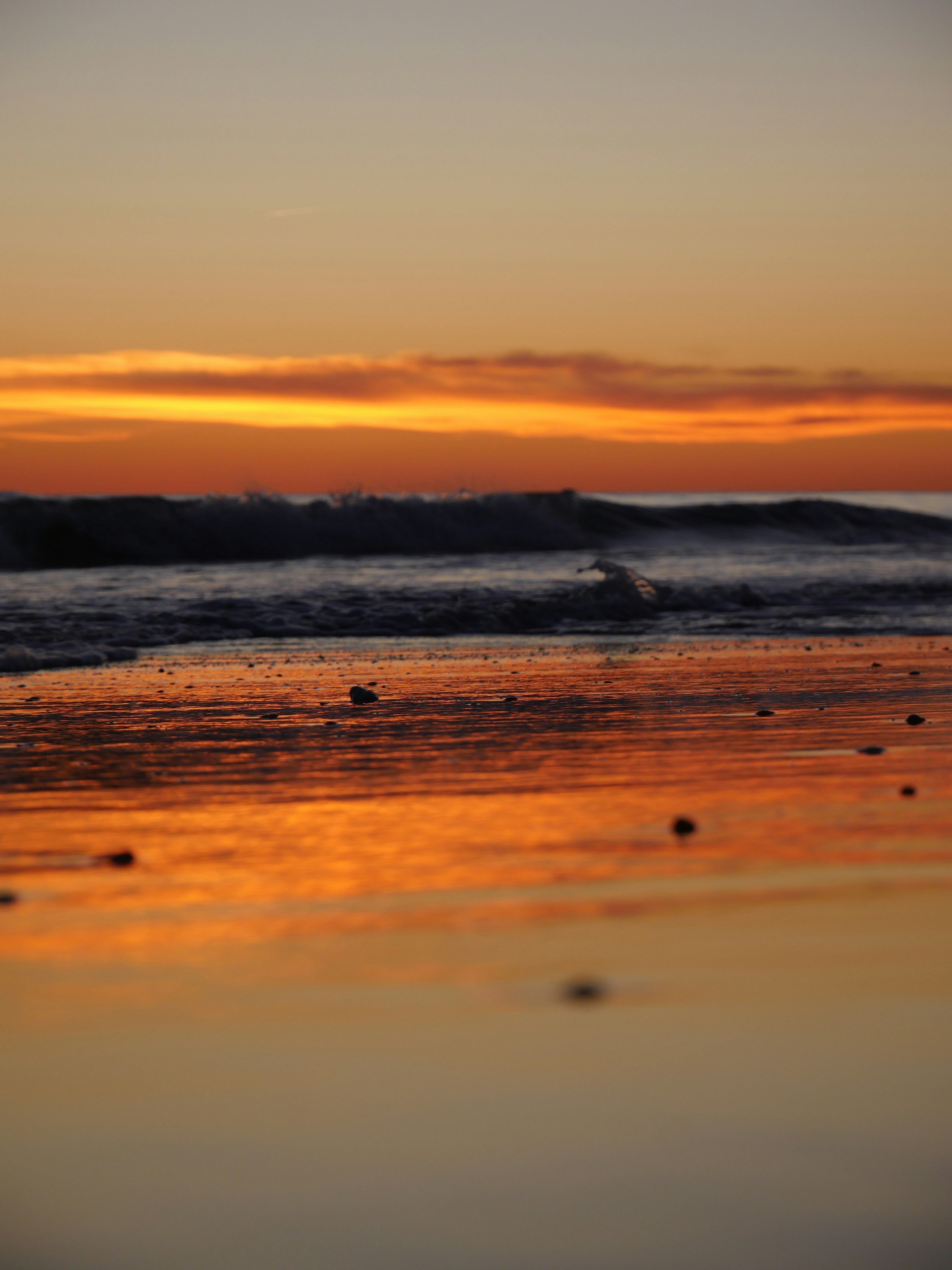 Horizon Ember: Sunset Reflections on a Quiet Shore