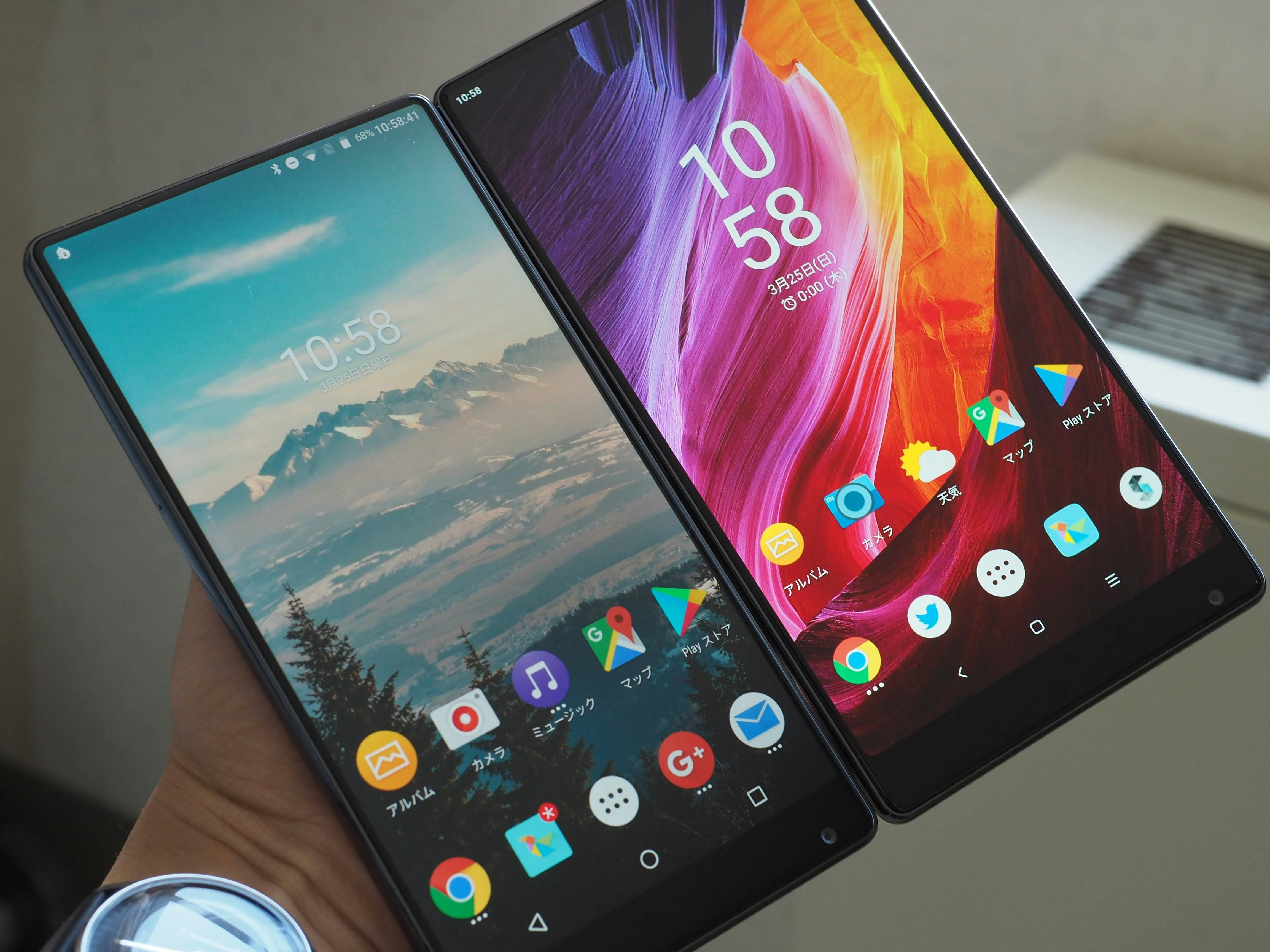 A person holding two cell phones in their hands photo – Free Gadget ...