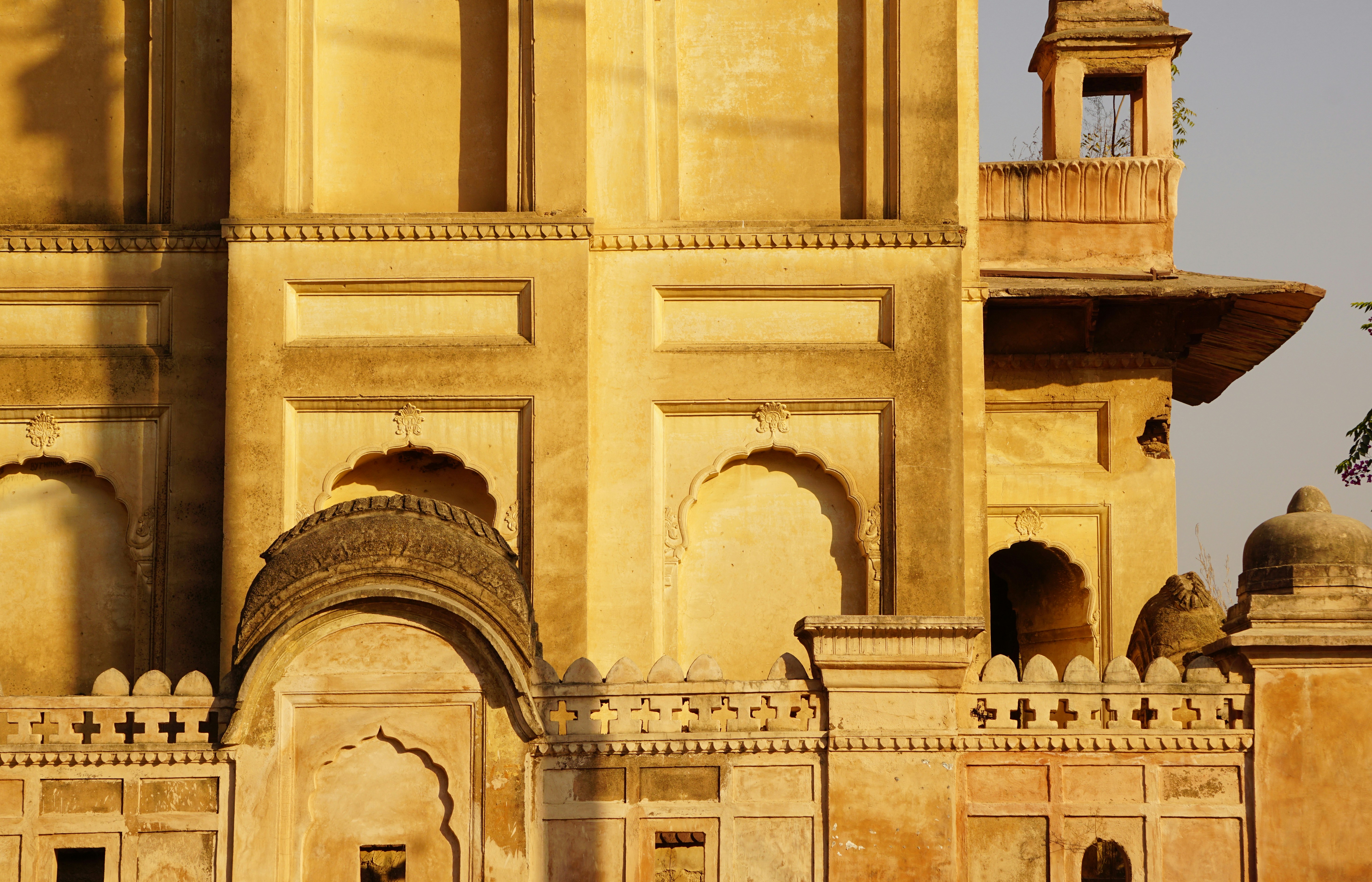 a large building with a clock on it's side