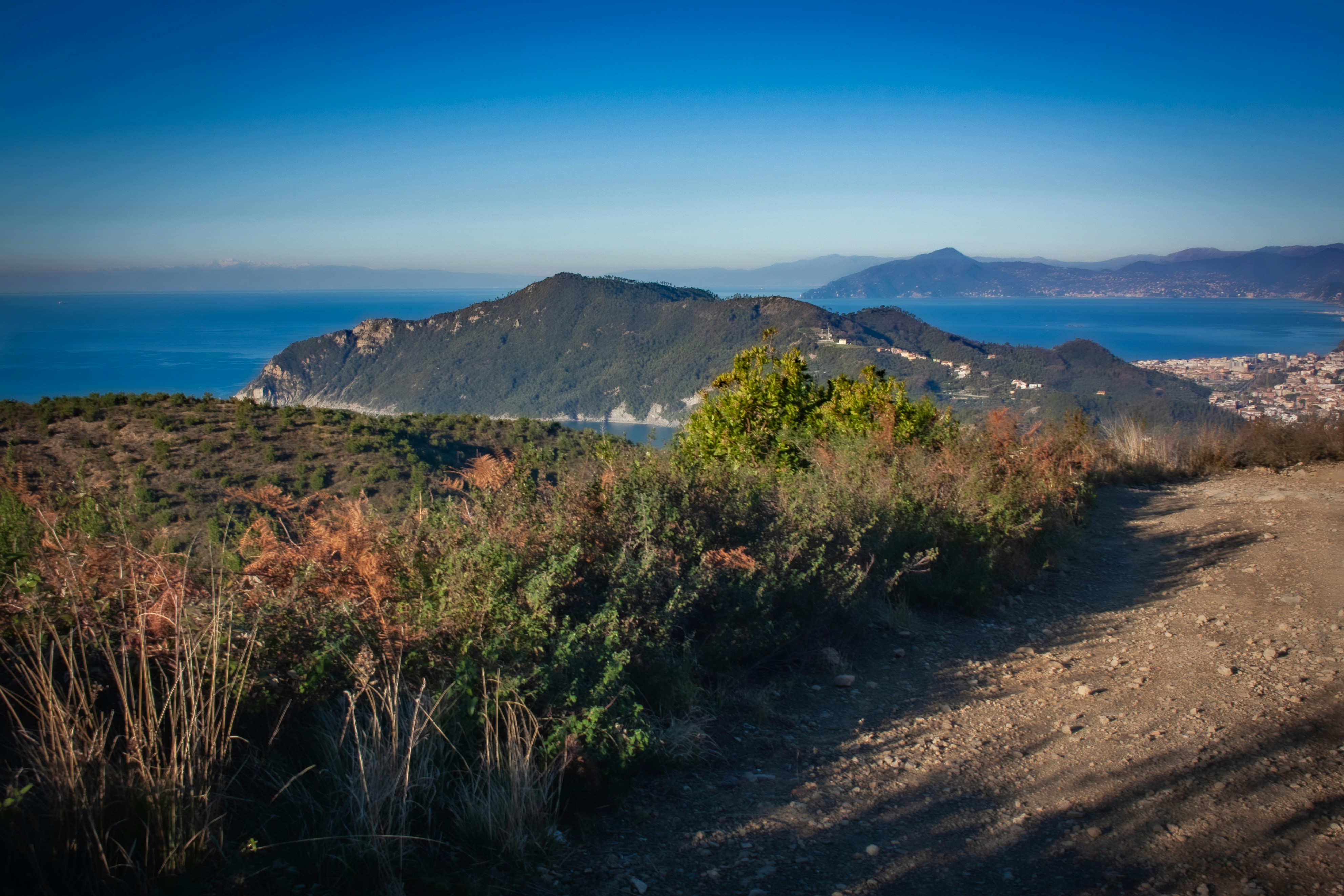 Coastal Ridgeway: A Sunlit Path Bypassing the Cliffline