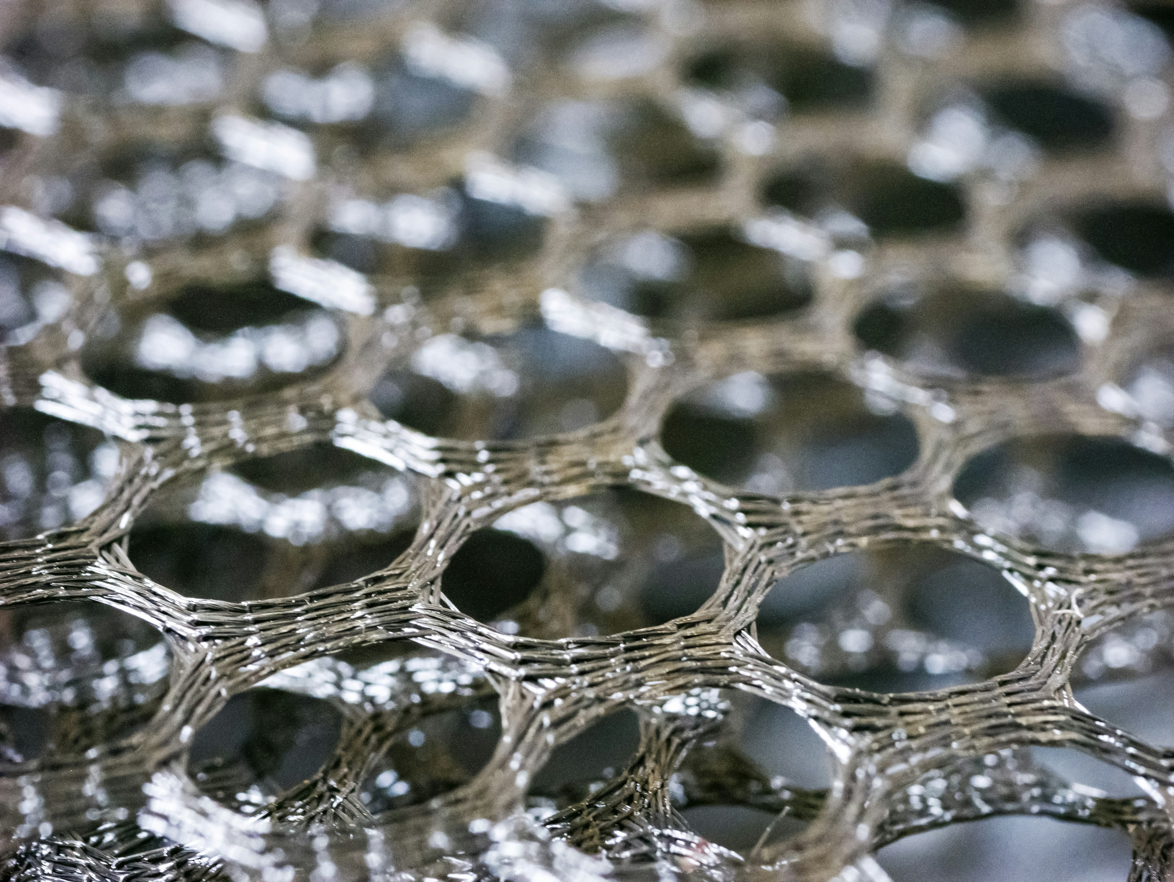 A close up view of a metal mesh photo – Free Trypophobia Image on Unsplash