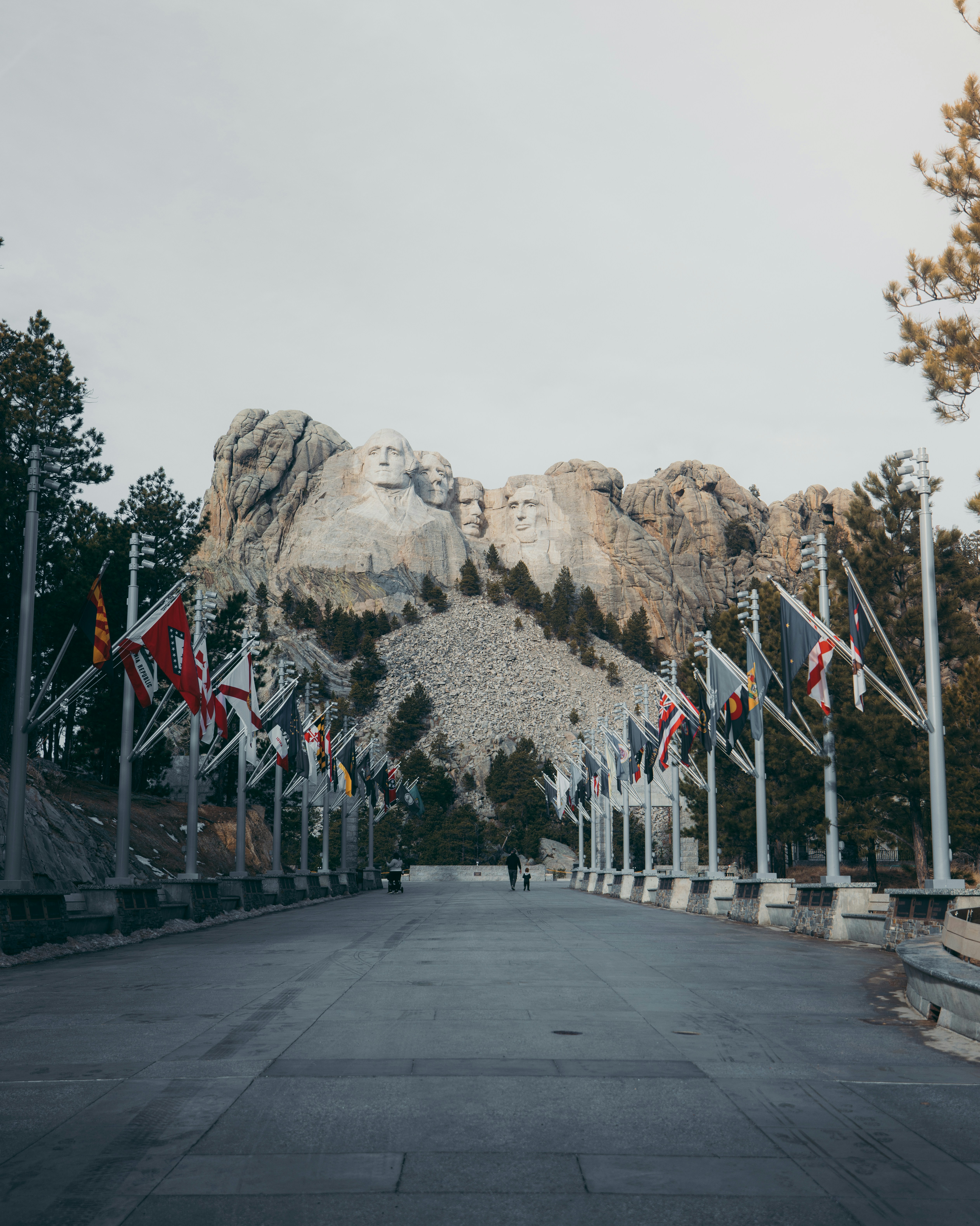 Flag-lined Path Toward the Mountain Faces