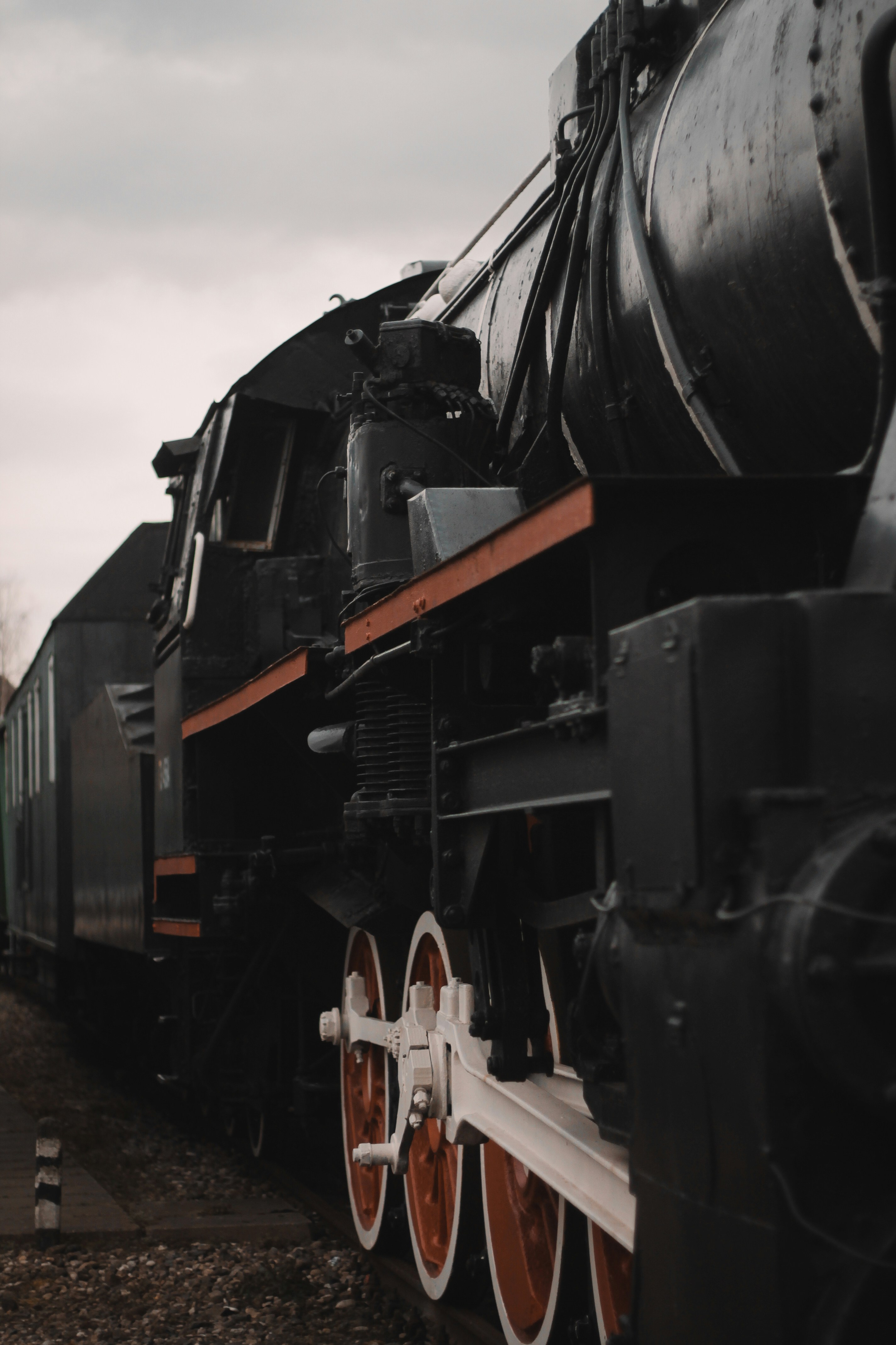 A black train engine sitting on top of train tracks photo – Free Train ...