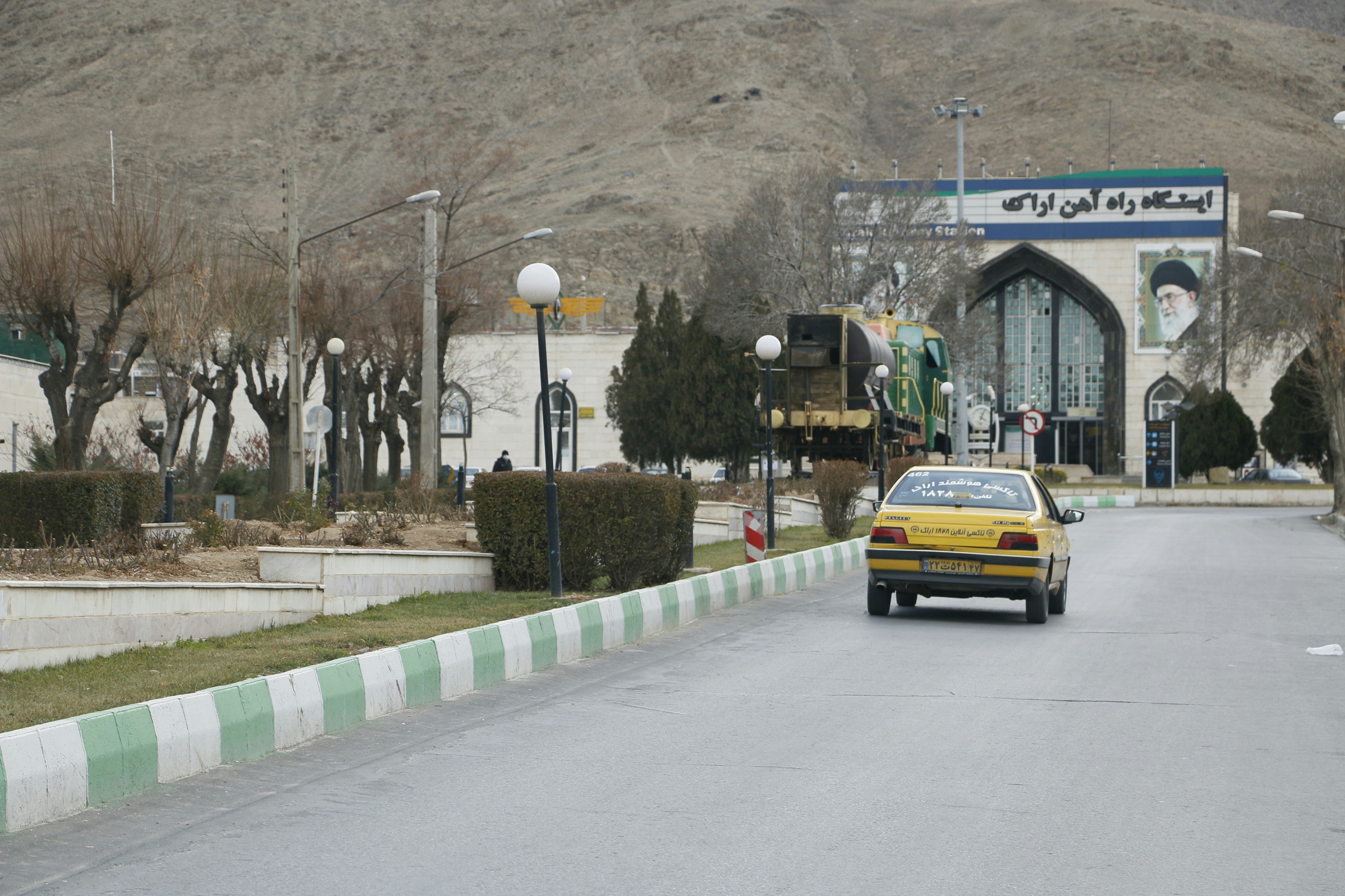 Yellow Taxi at the Threshold of a Persian Gate