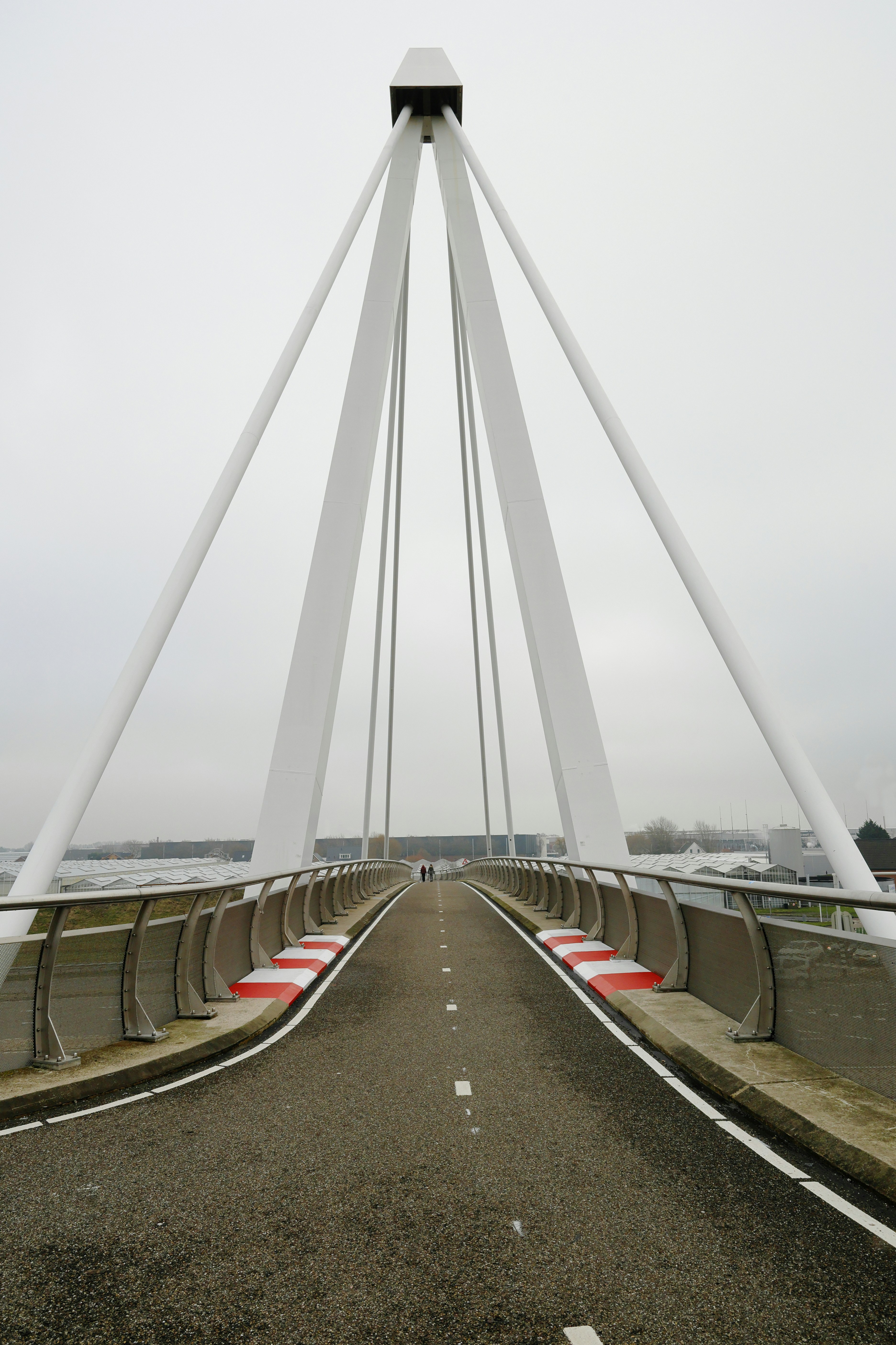 A very tall white bridge over a wide open road photo – Free De ...