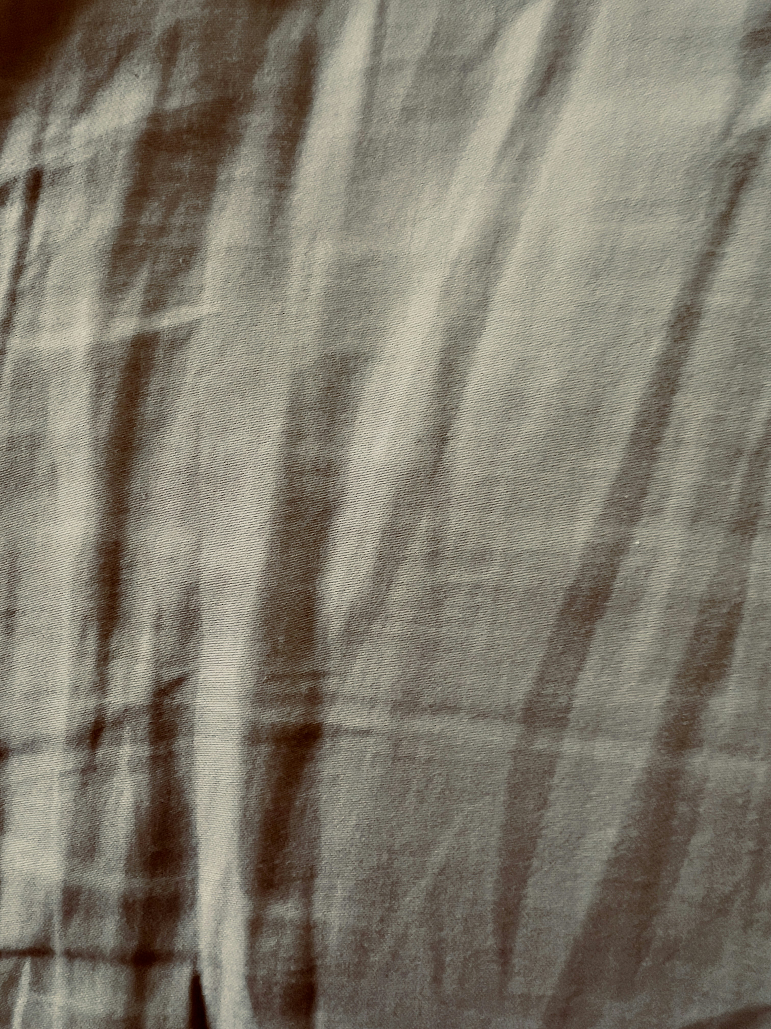 A close up of a bed with a white comforter photo – Free Iphone Image on ...