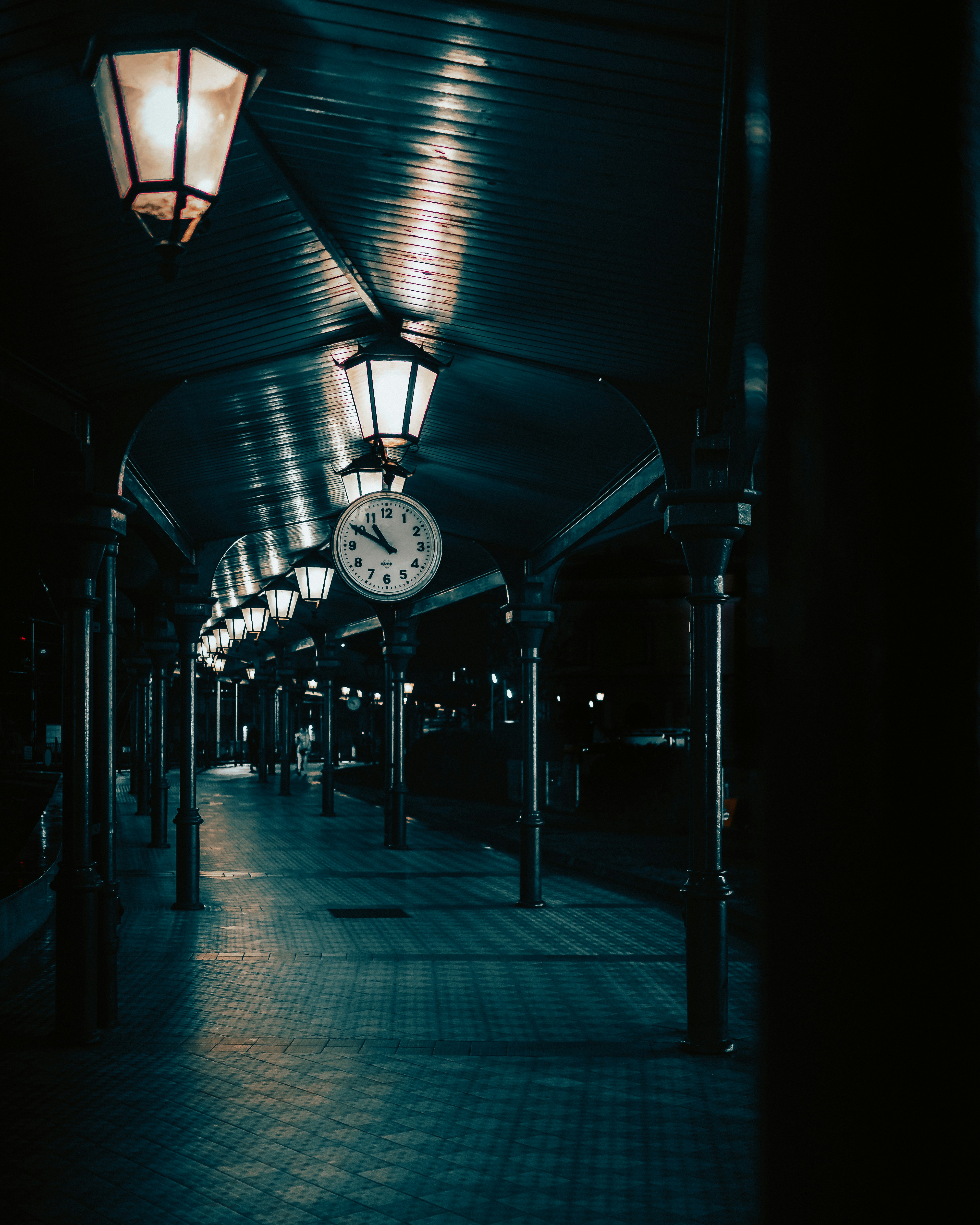 Beautiful tunnel at the exit of the main railway station in Krakow. Photo taken at night.