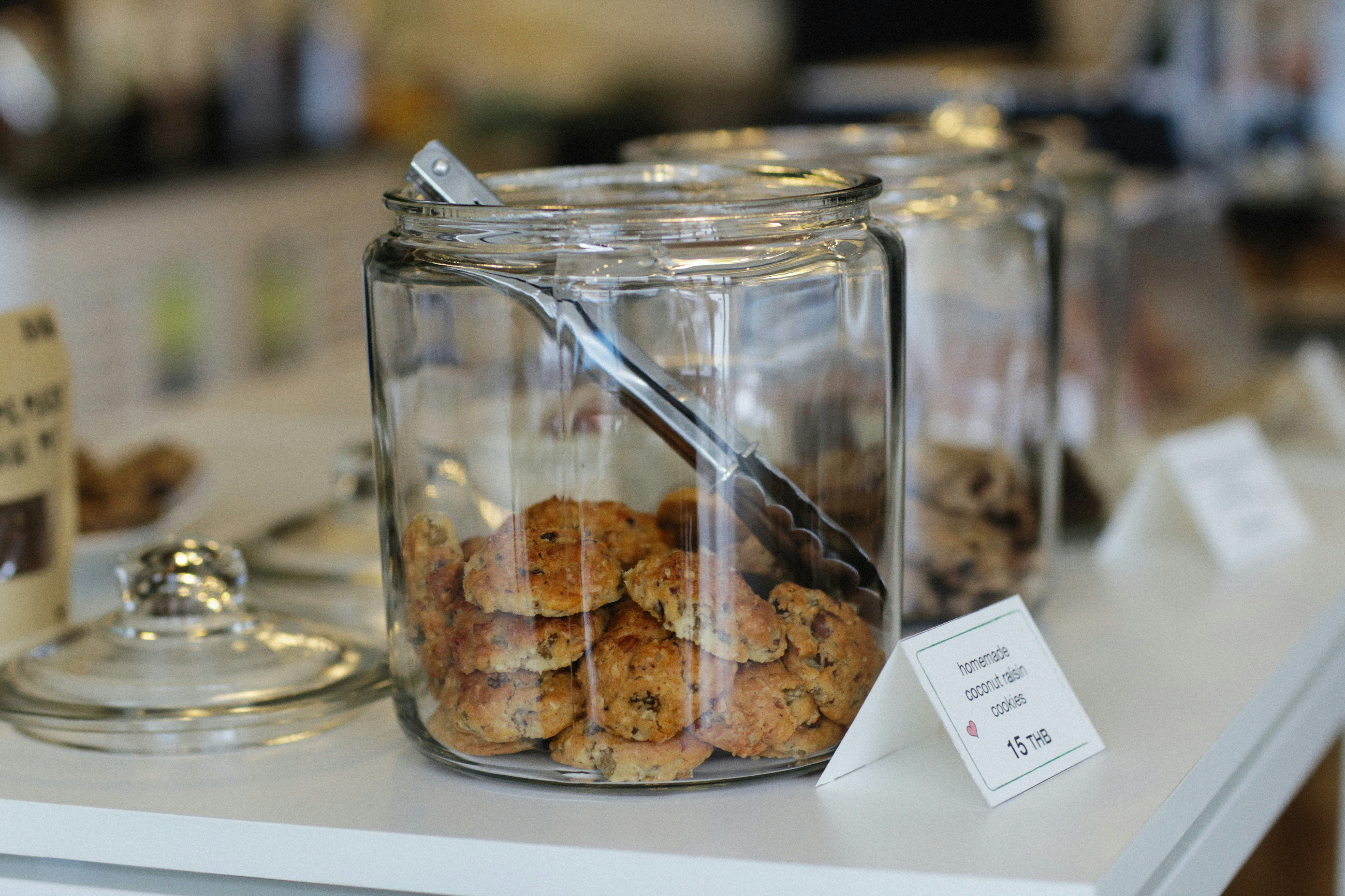 Jarred Cookies on a White Display Shelf