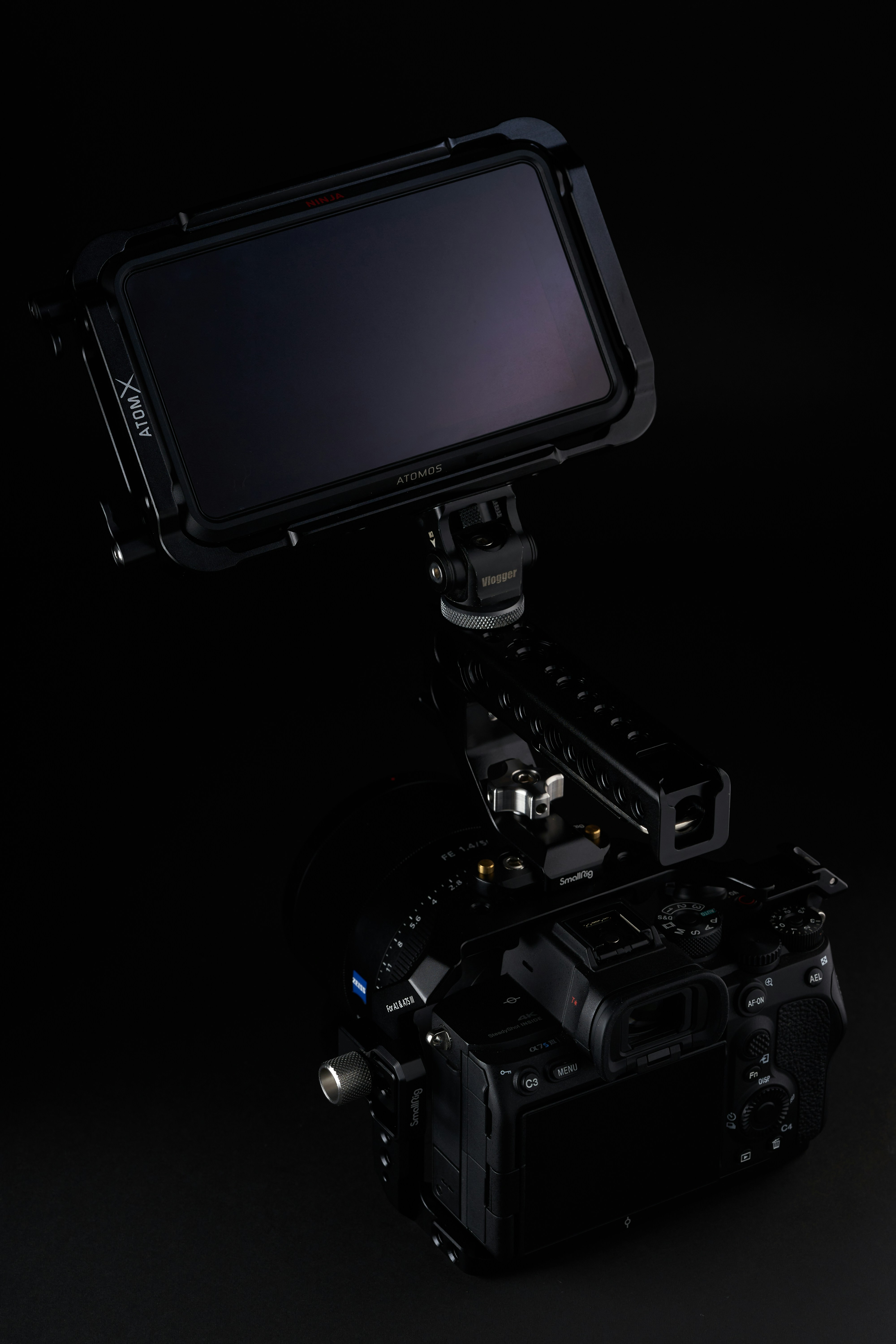 A camera with a cell phone attached to it photo – Free Sony a7s iii ...