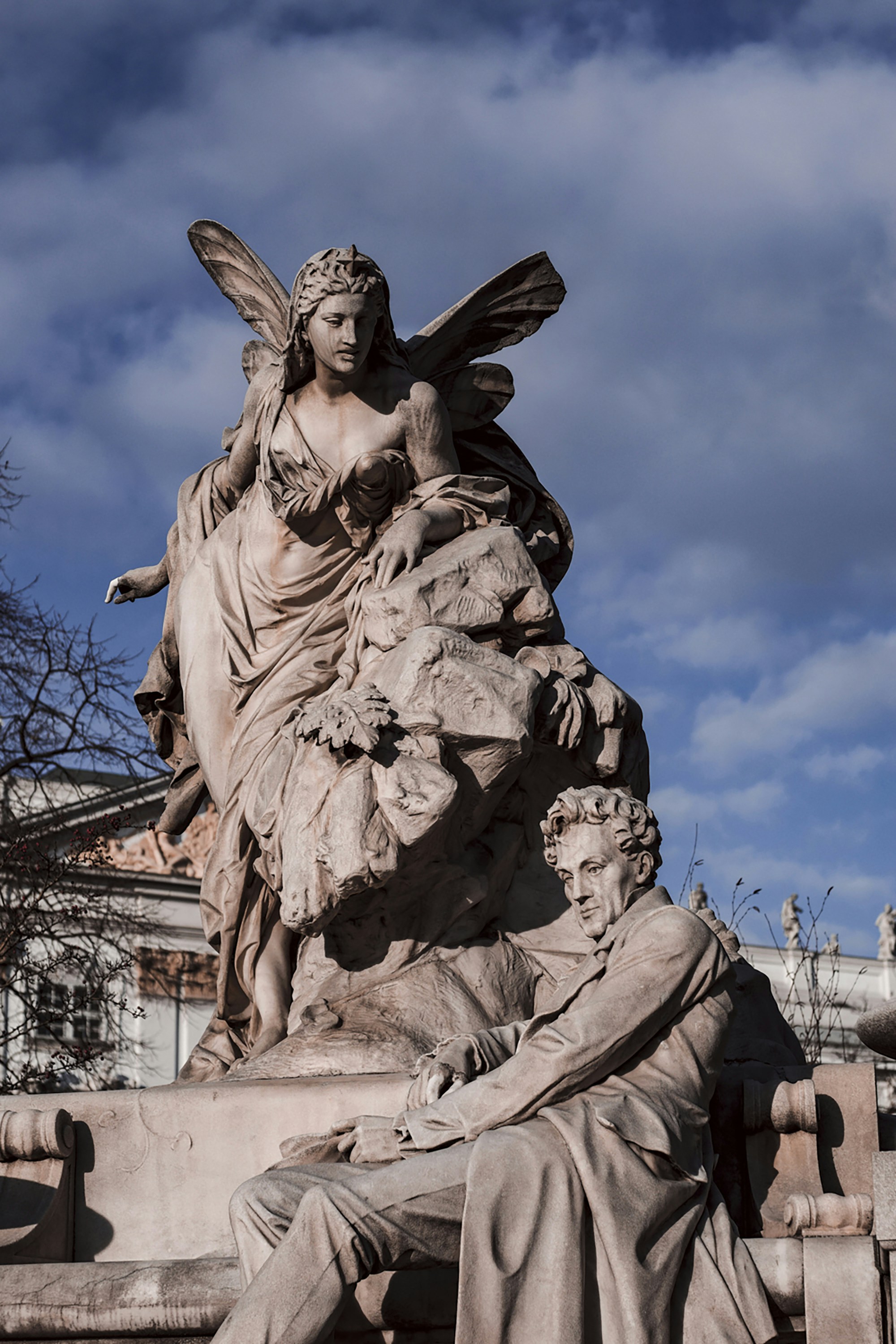 Angelic Overlook: A Stone Vigil Over the City