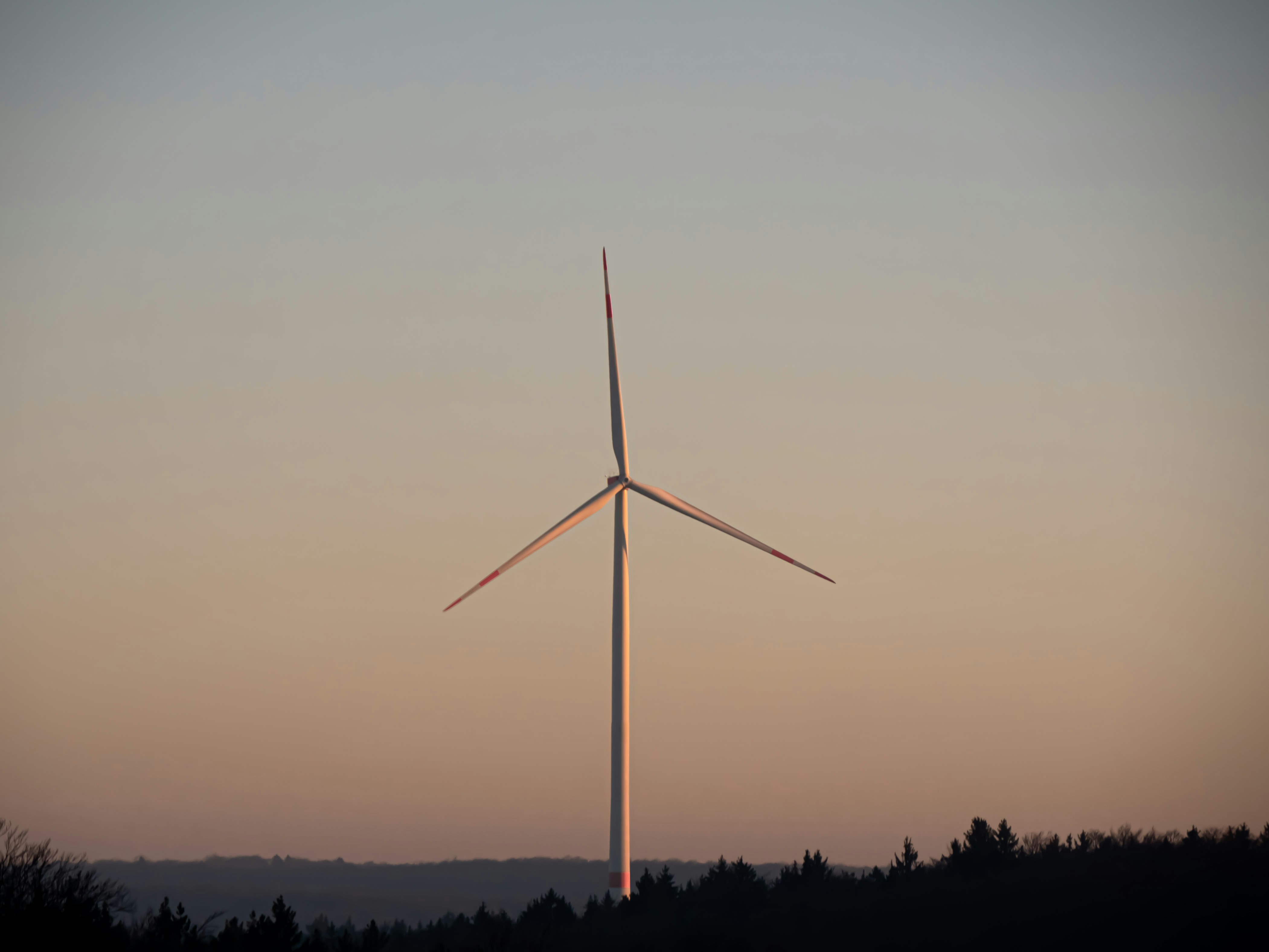 Dusk Equilibrium: Wind Turbine on the Quiet Horizon