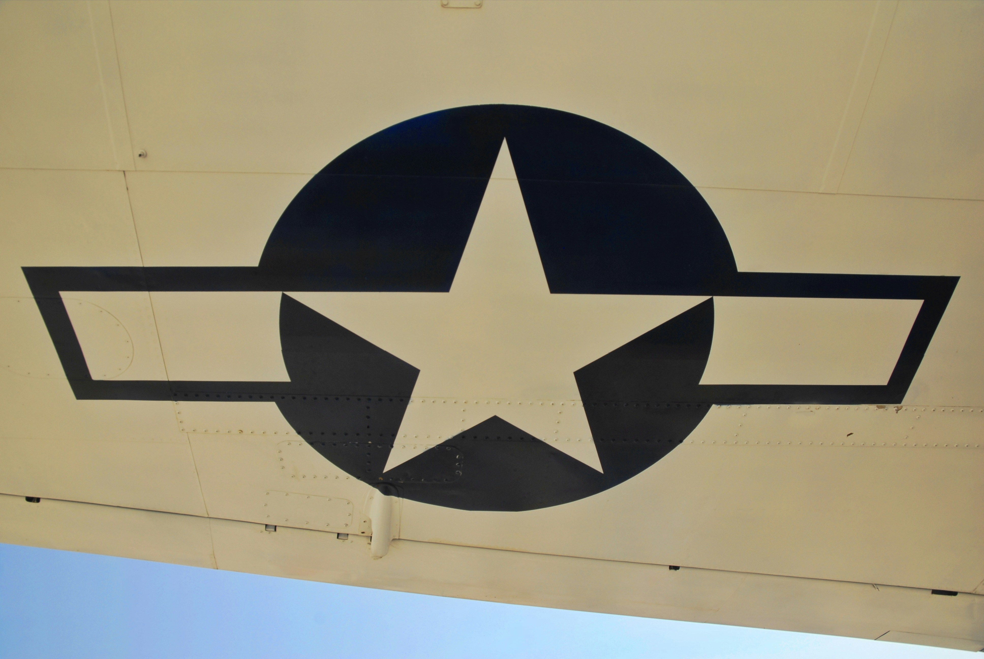A close up of the side of an airplane with a star on it photo – Free ...