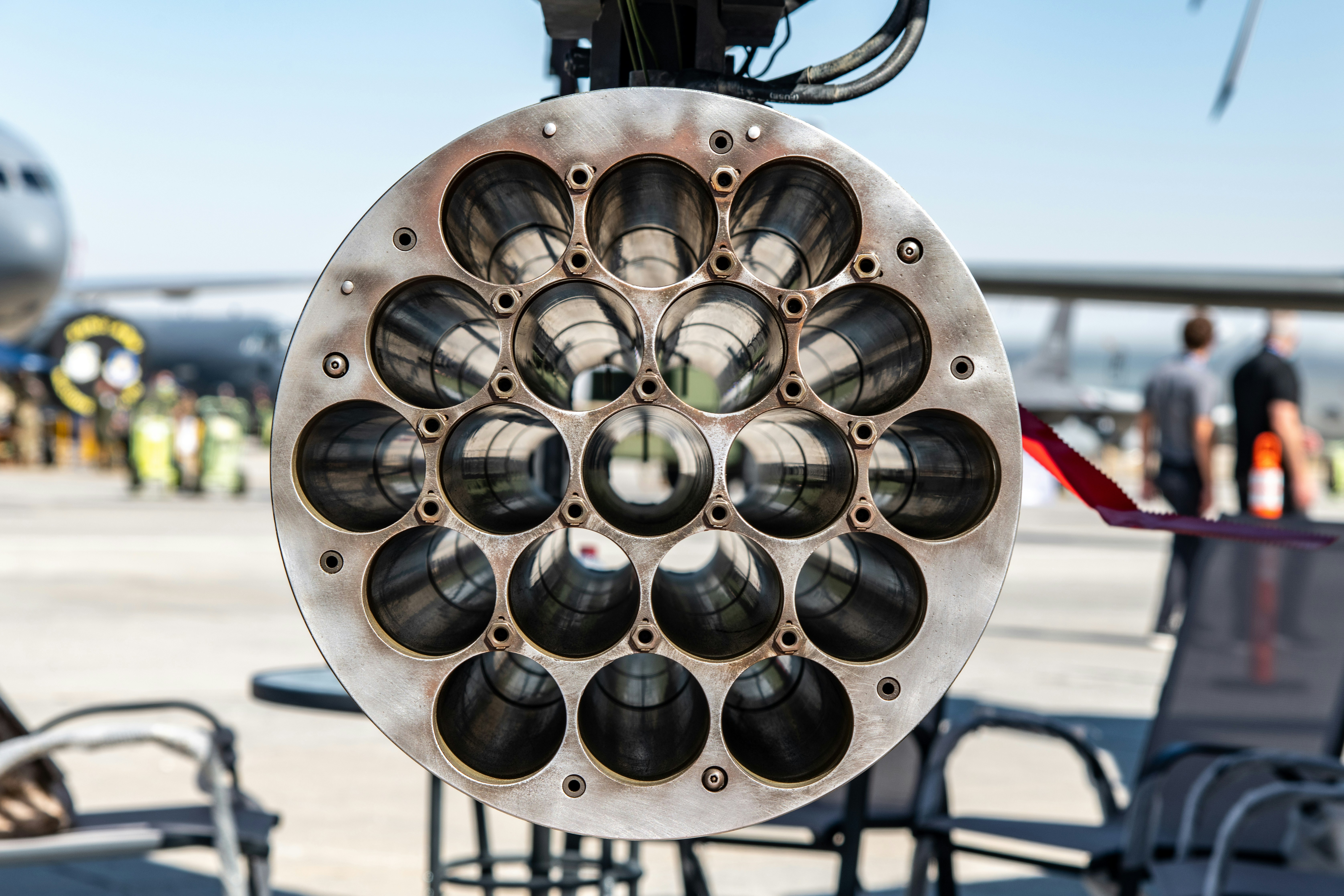 Close-up of a multi-barrel rocket engine face on an aircraft carrier apron