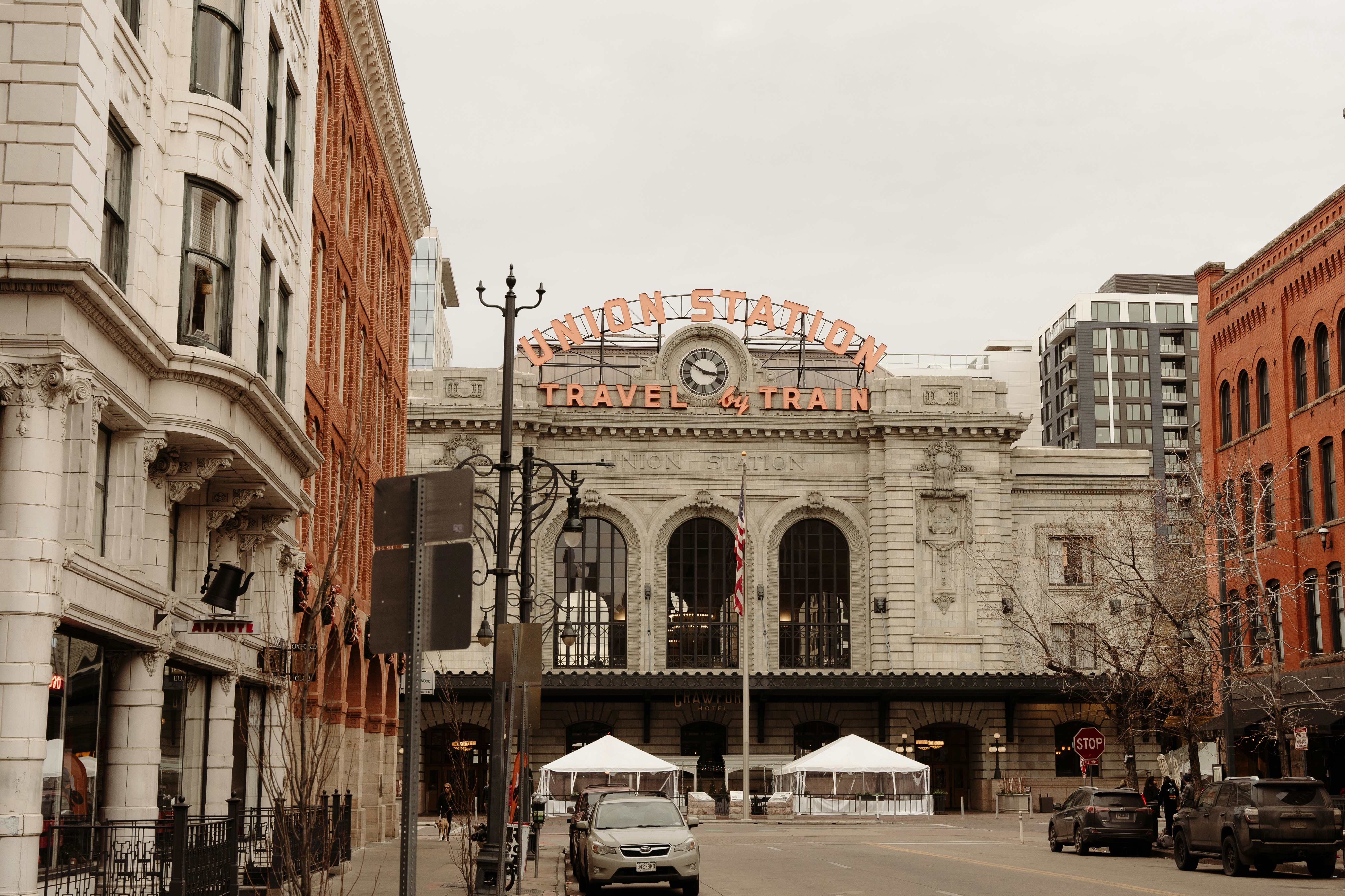 Travel Center Façade: Orange Neon Sign Above Historic Station
