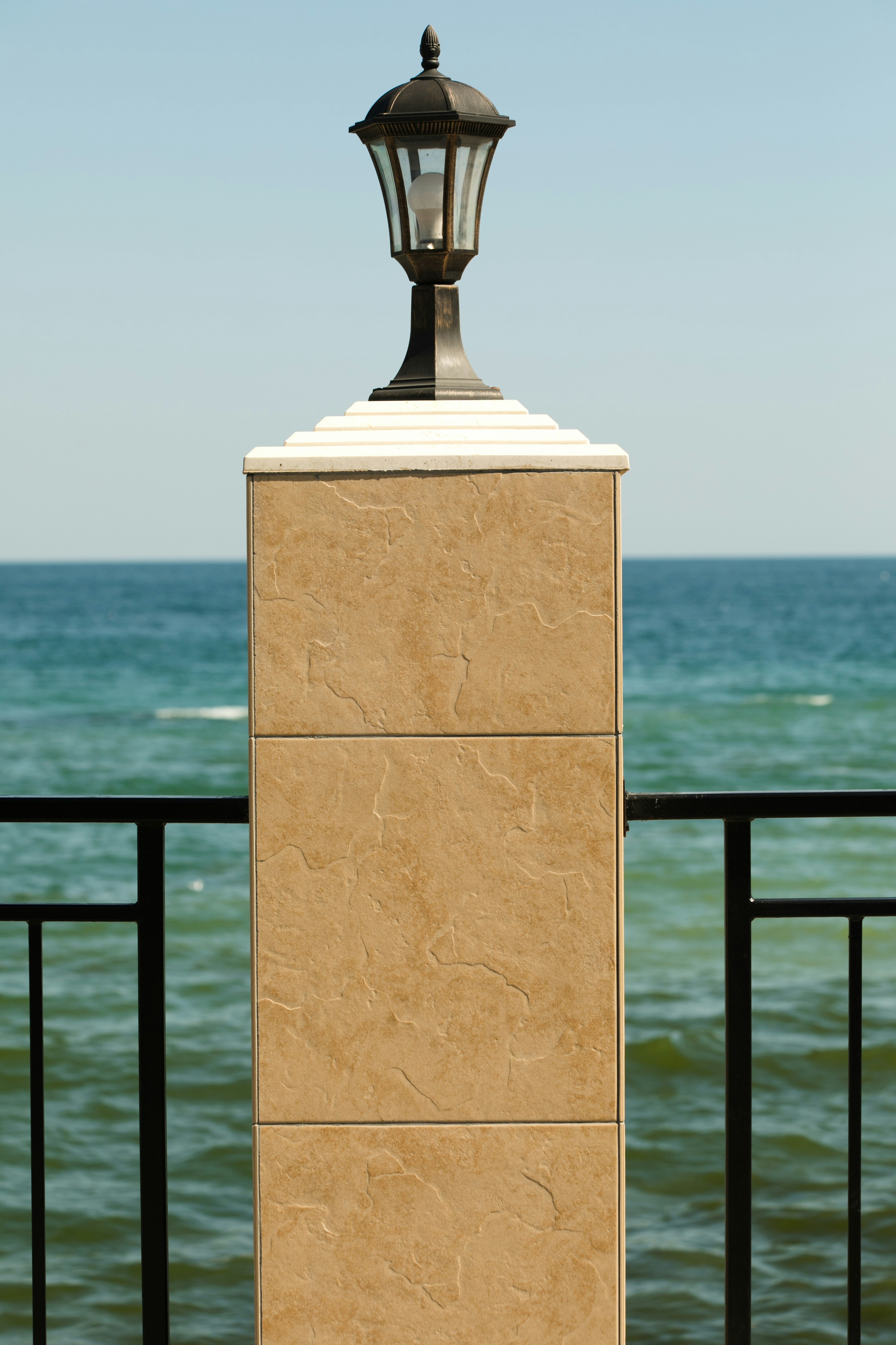 Lantern Crown on a Seaside Pillar: Beacon by the Blue