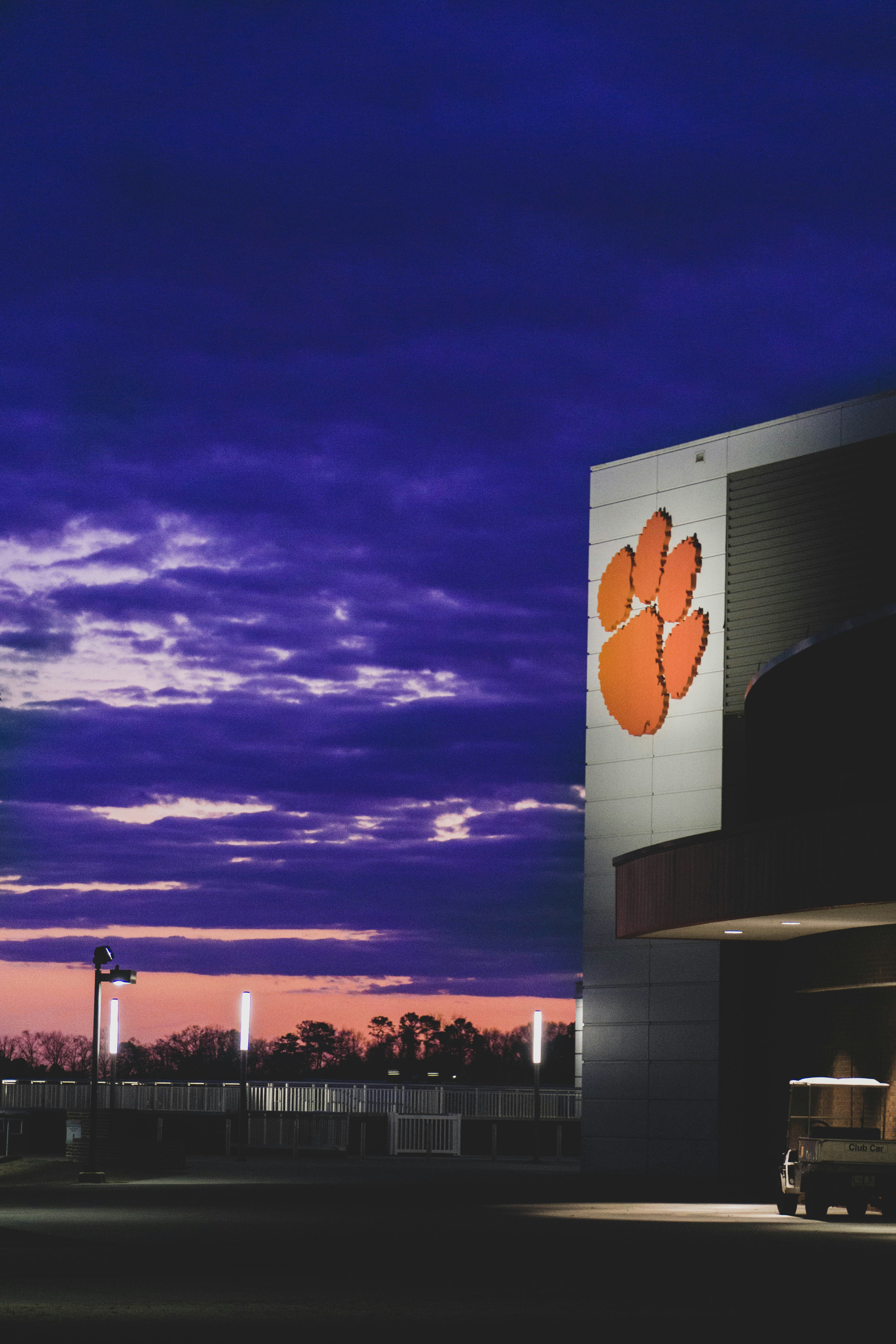 A car is parked in front of a building photo – Free Clemson Image on ...