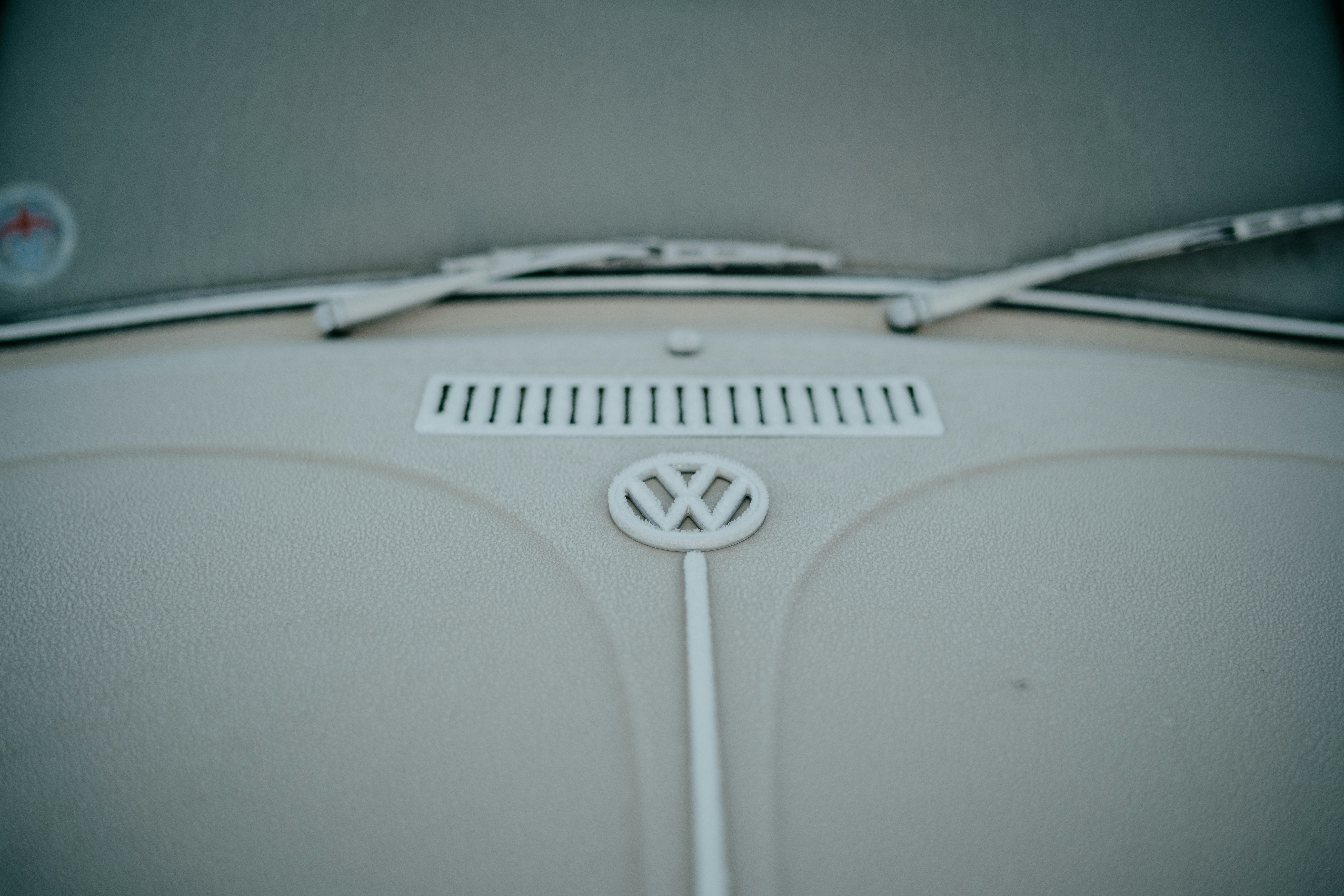 Centered VW Emblem on a Quiet Vintage Hood