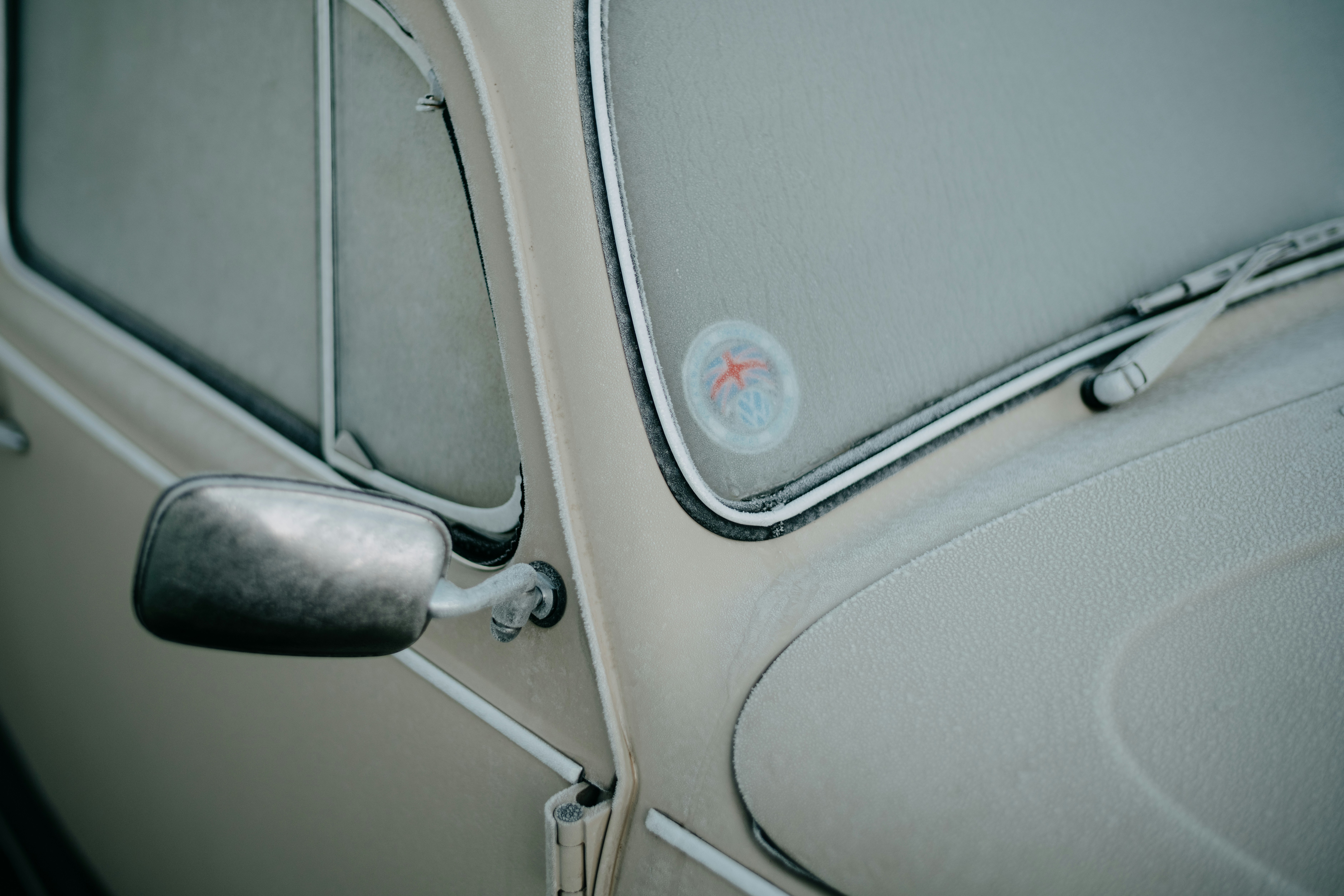 Patinaed Quiet: Close-Up on a Vintage Car Door