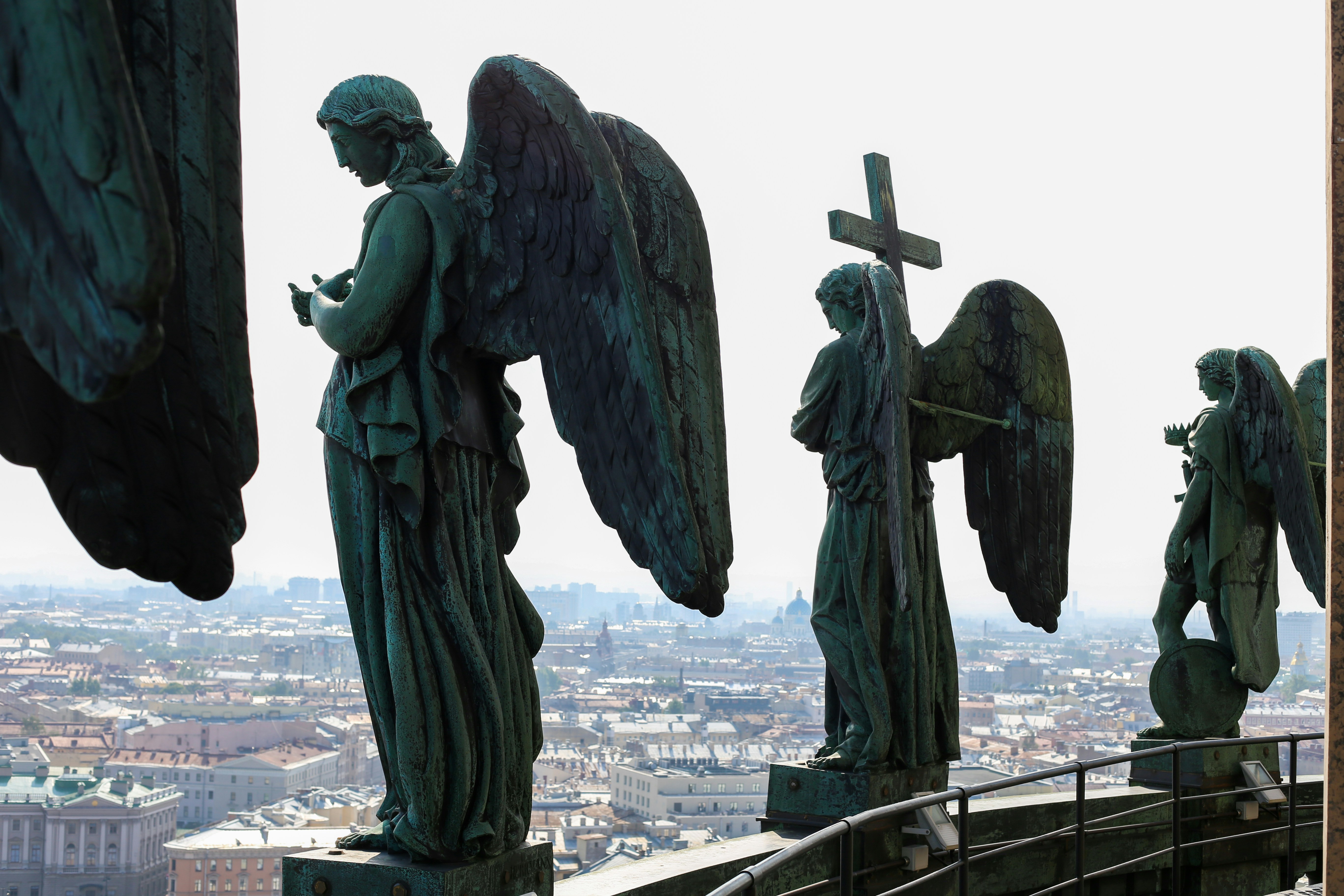 A group of statues of angels on top of a building photo – Free Russia ...