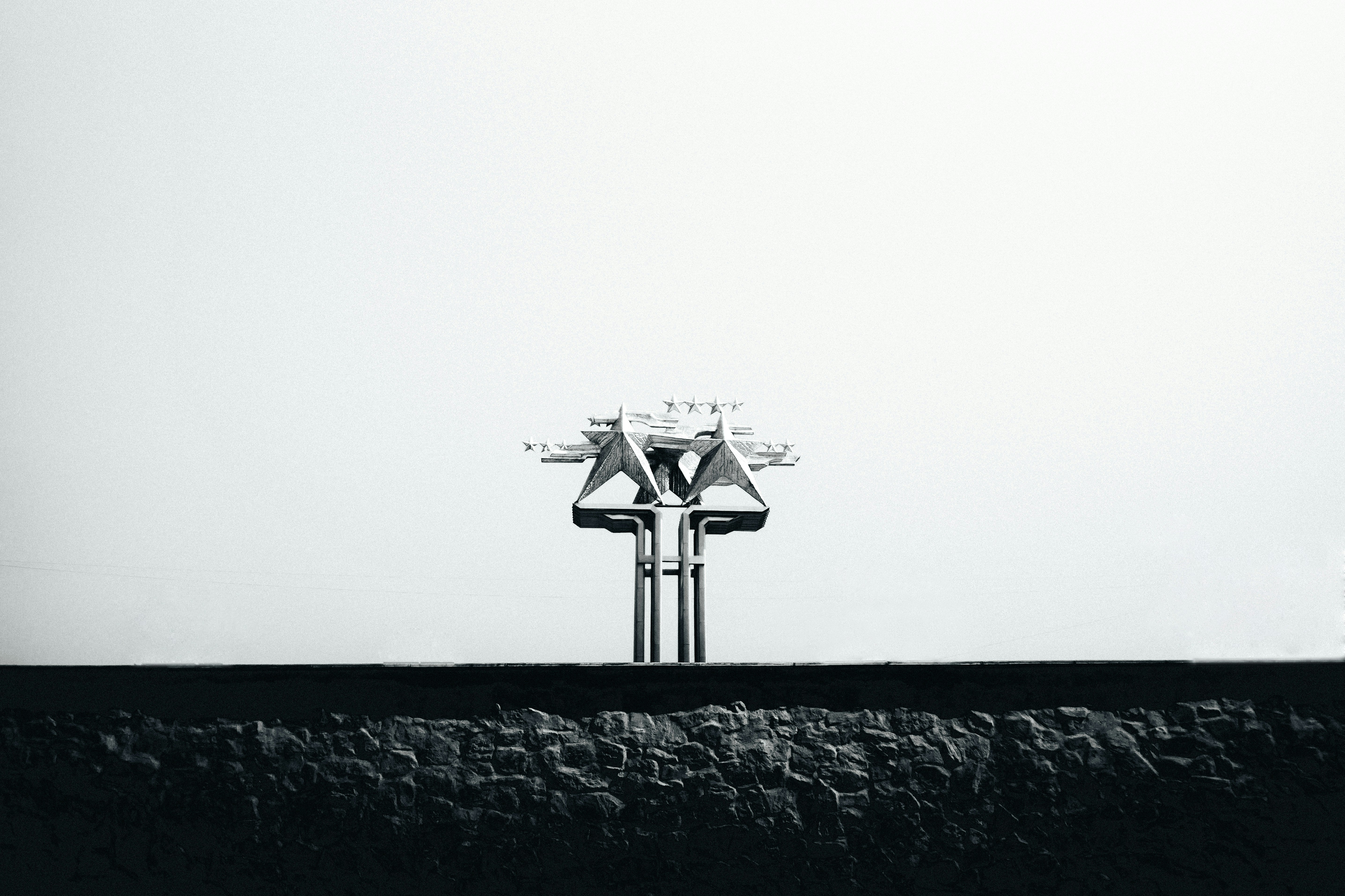 a black and white photo of a street sign