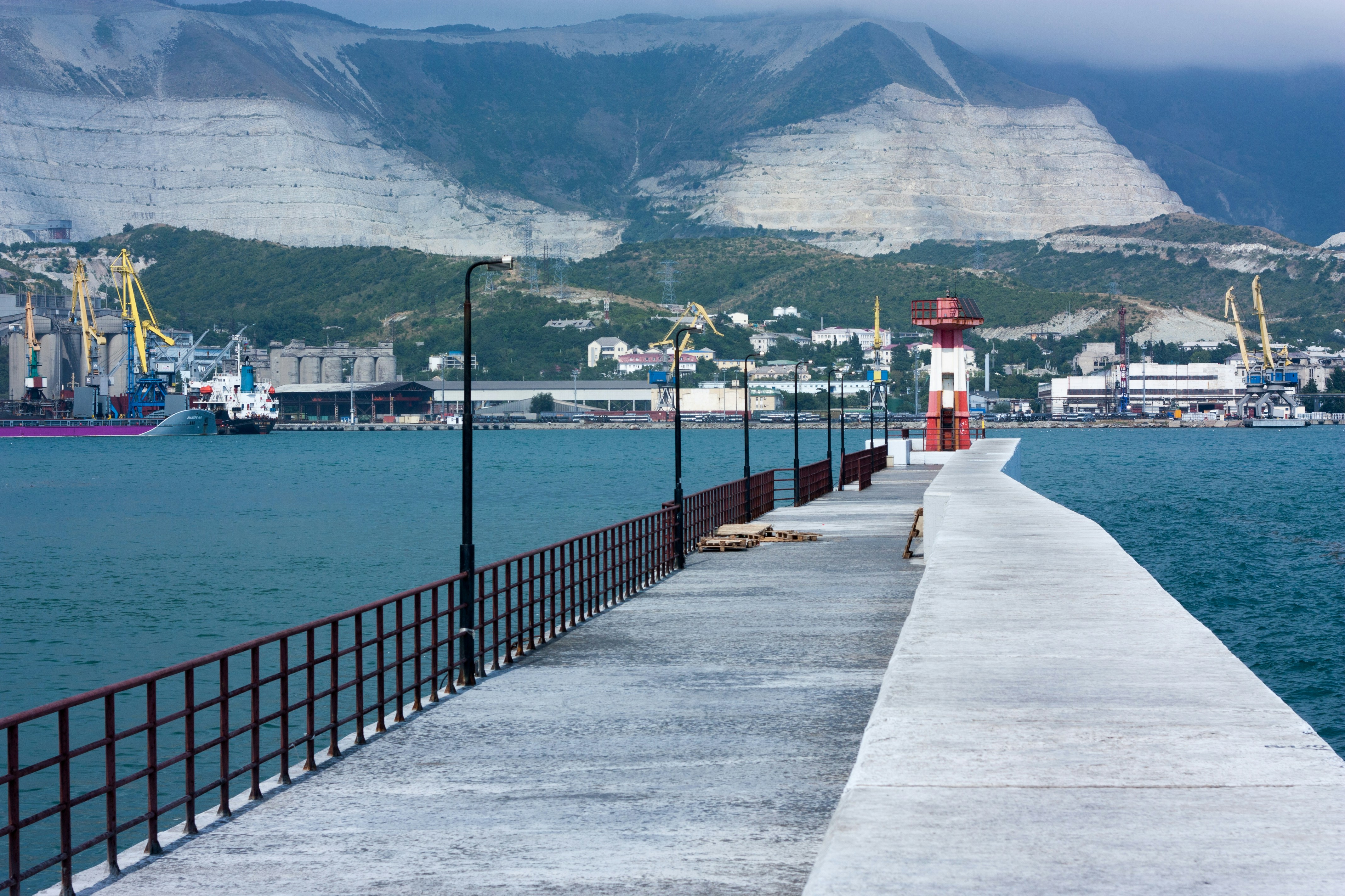 Red Lighthouse at the Pier’s Vanishing Point
