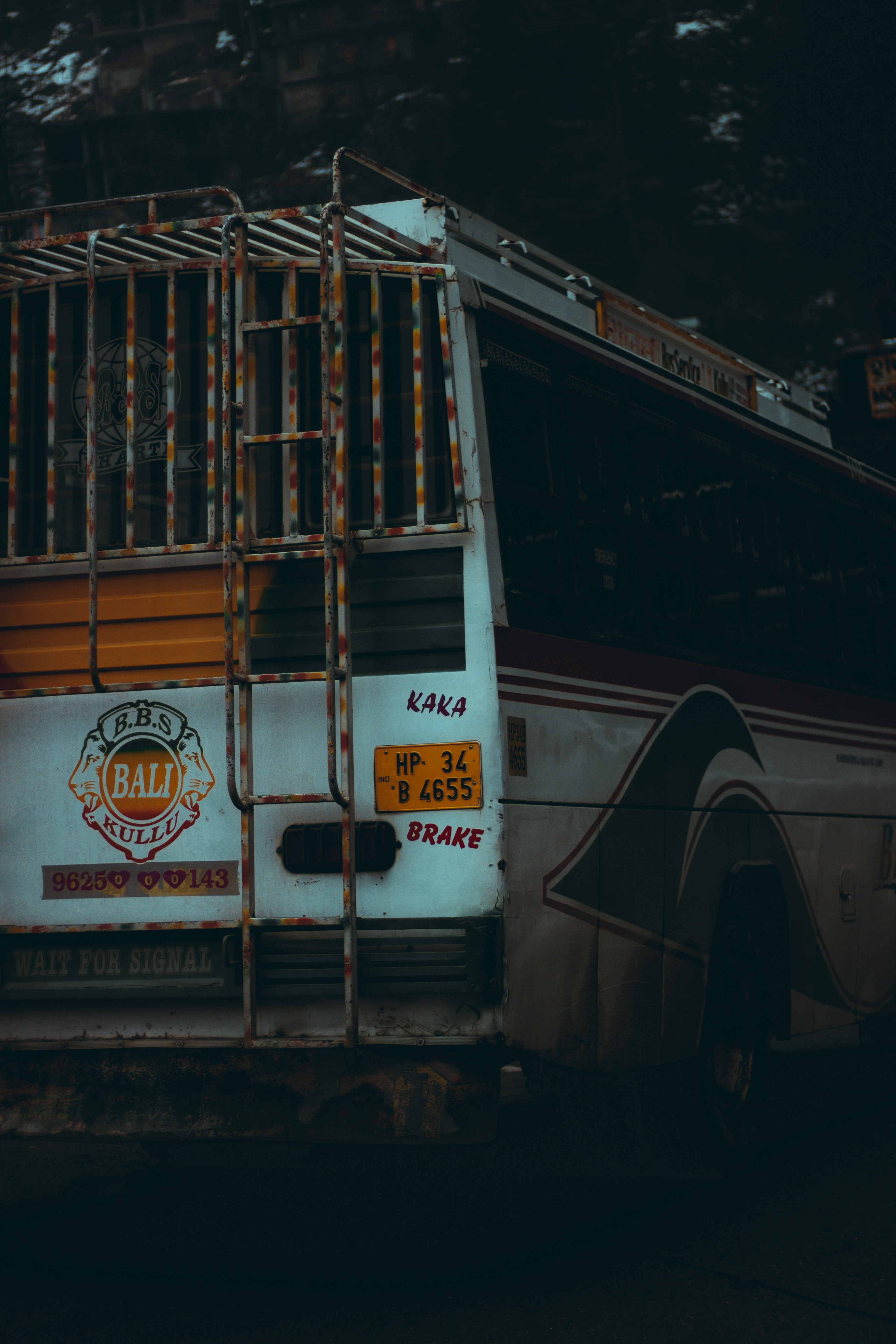 A bus with a cage on the back of it photo – Free Himachal pradesh Image ...