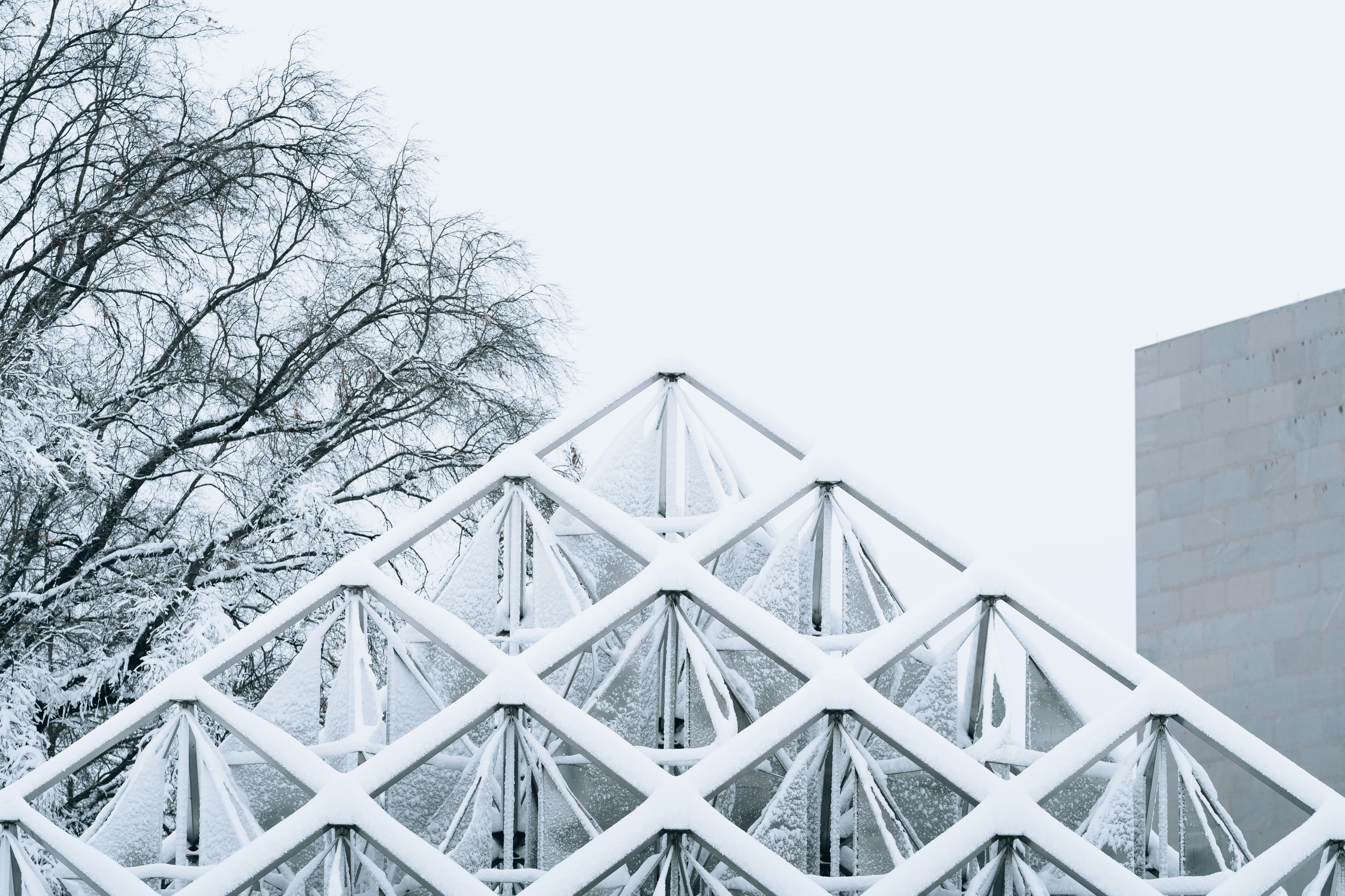 Geometric Glass Facade Weave Under Winter Light