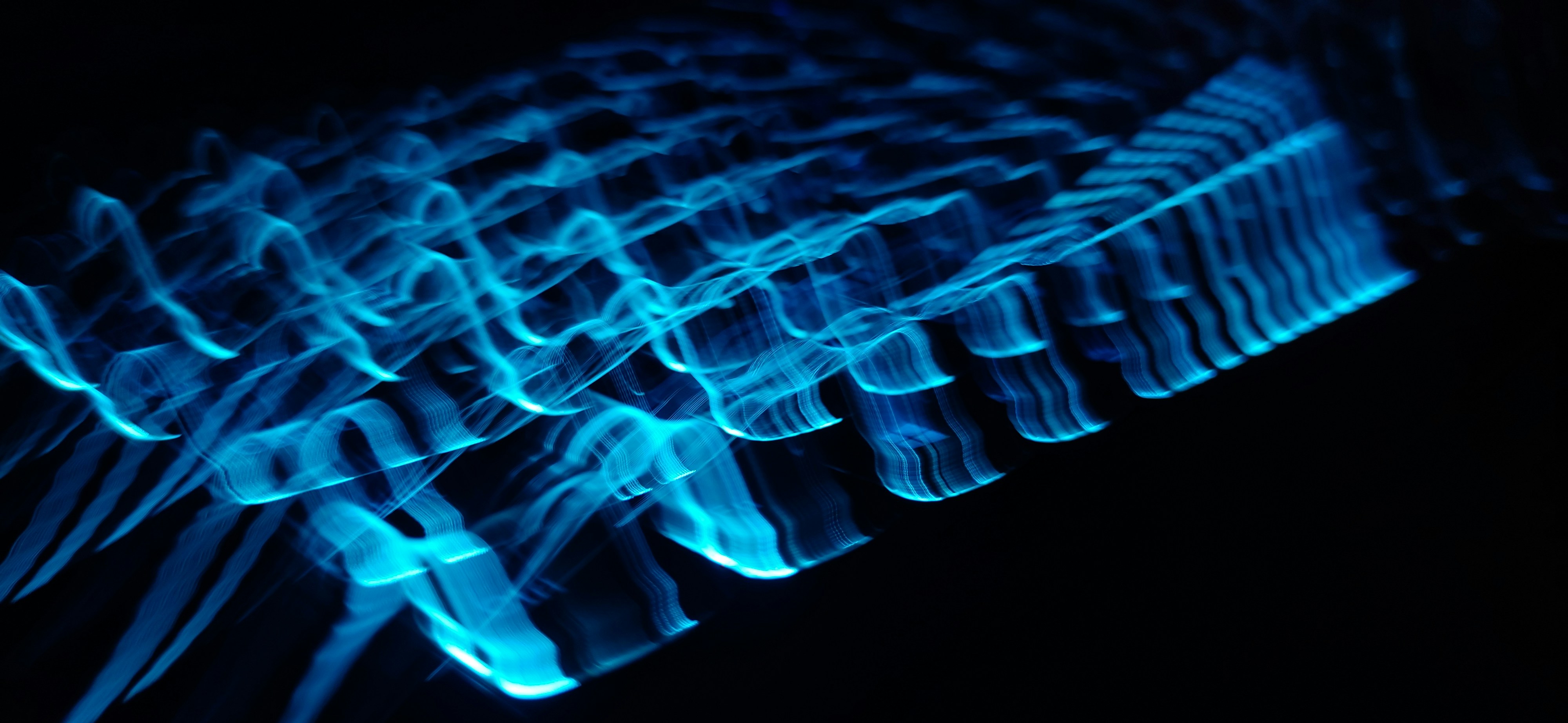 A close up of a blue object in the dark photo – Free Pattern Image on ...