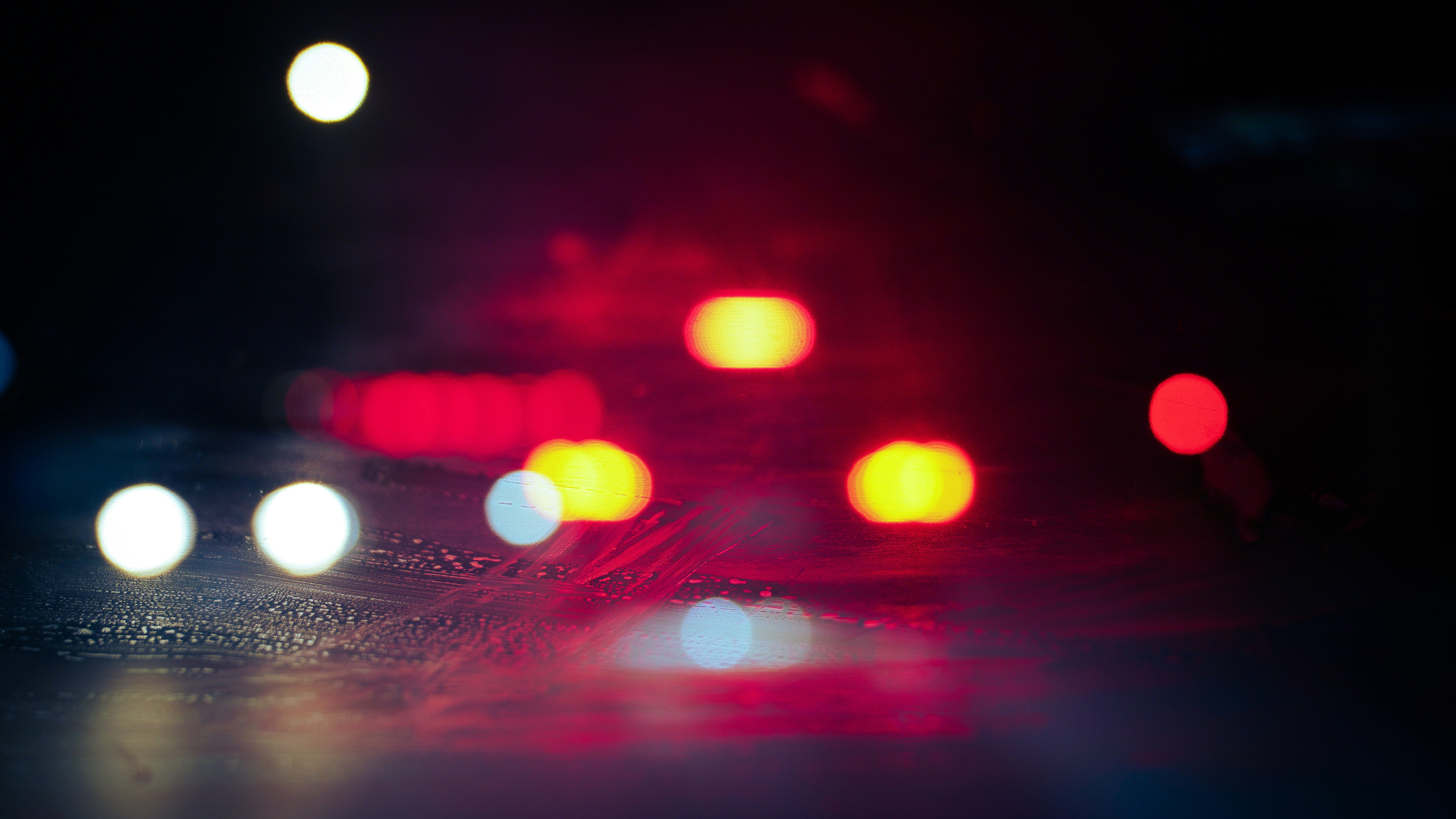 A blurry image of a street light at night photo – Free Space Image on ...