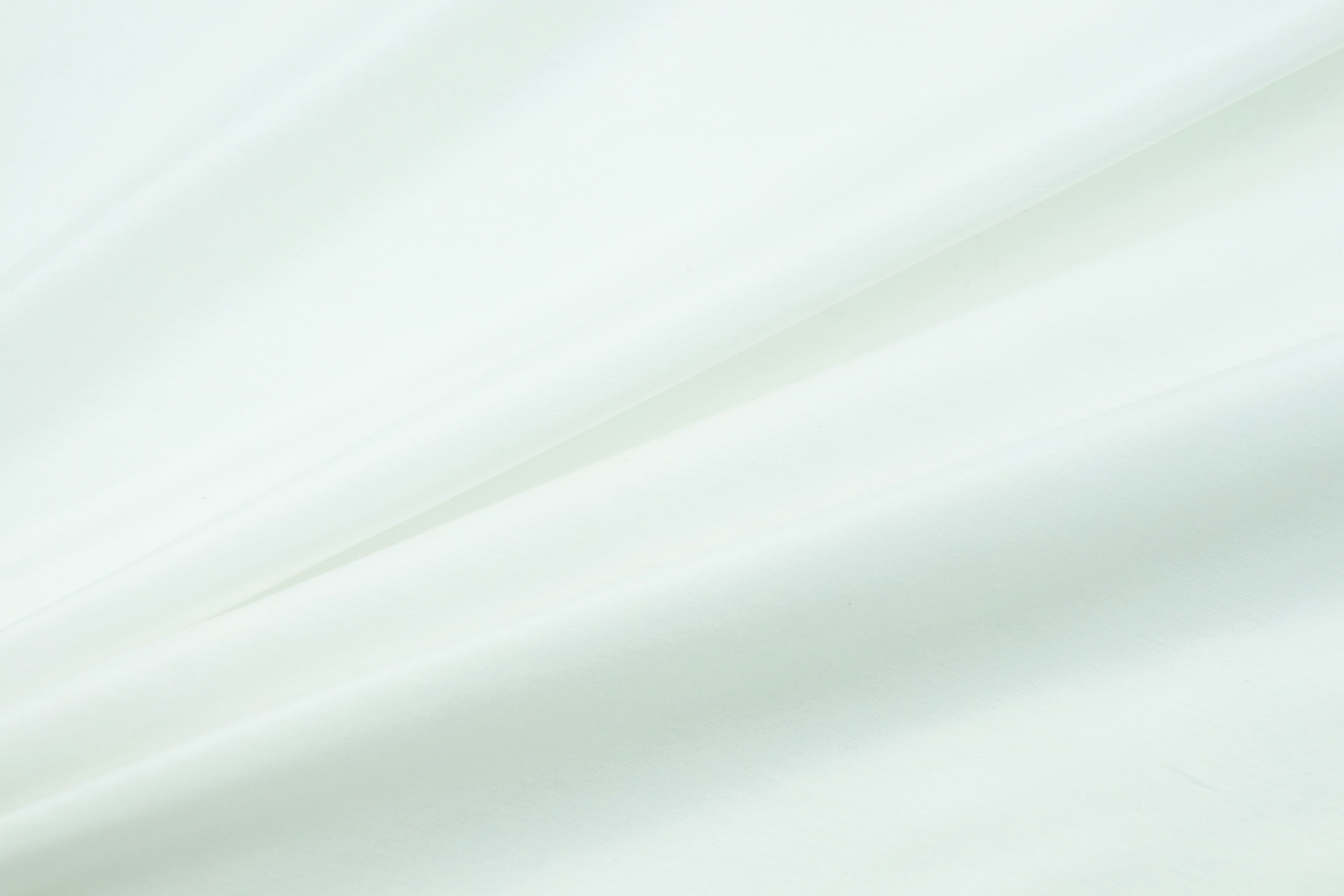 A close up of a white sheet with a white background photo – Free Text ...