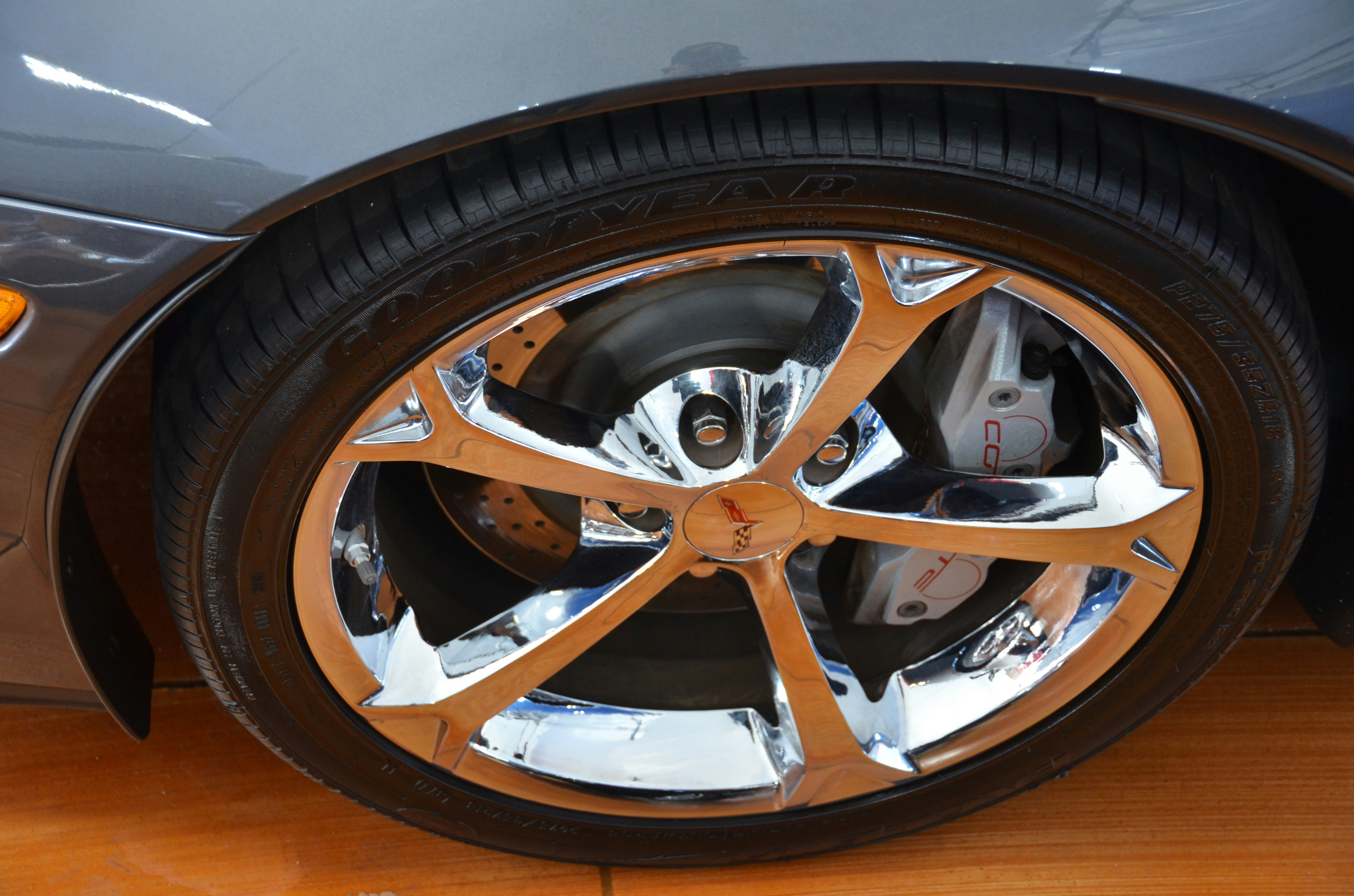 Late model corvette chrome 5 spoke wheel and disc brake caliper
