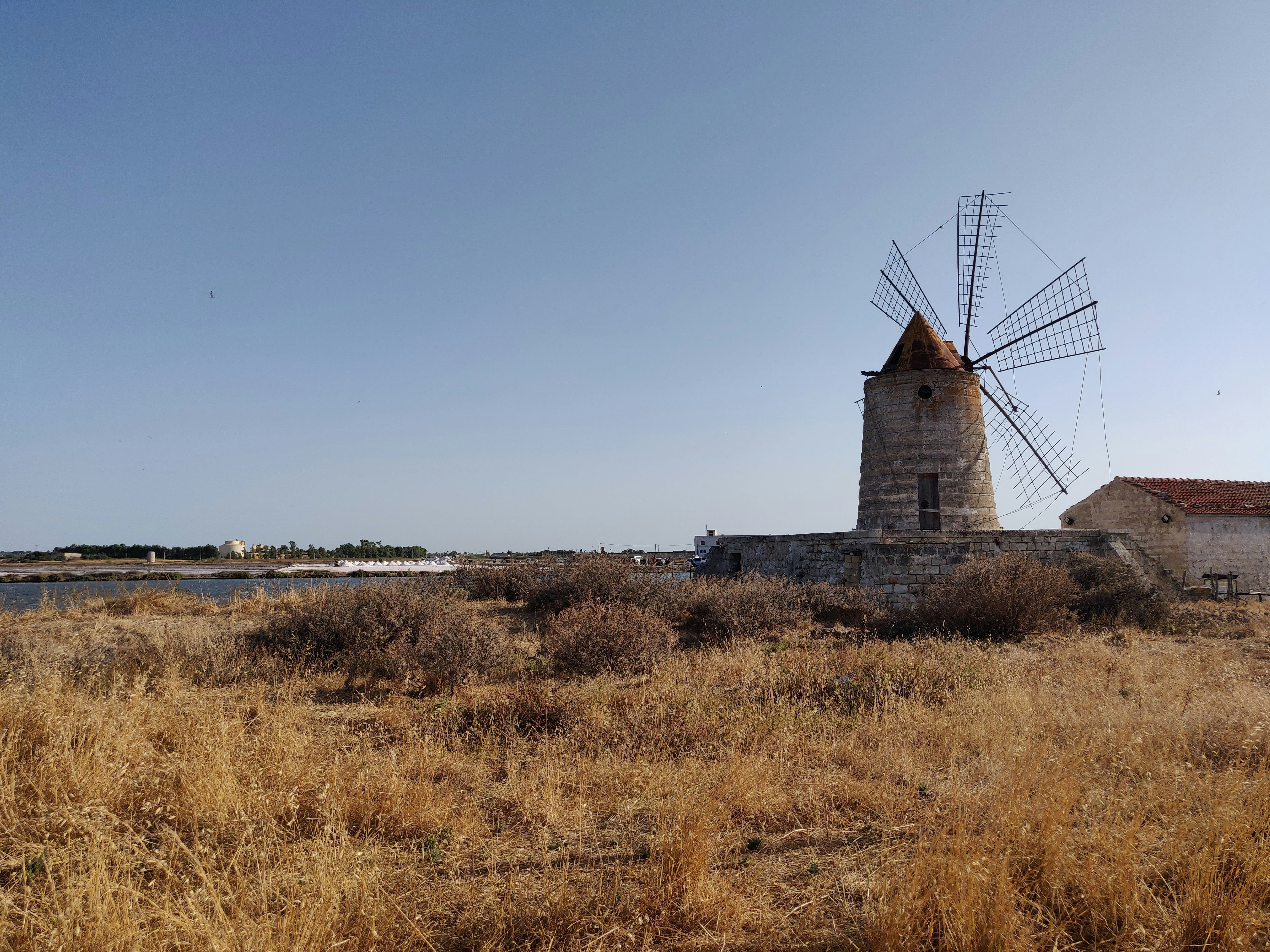 Deserted Windmill under a Clear Sky