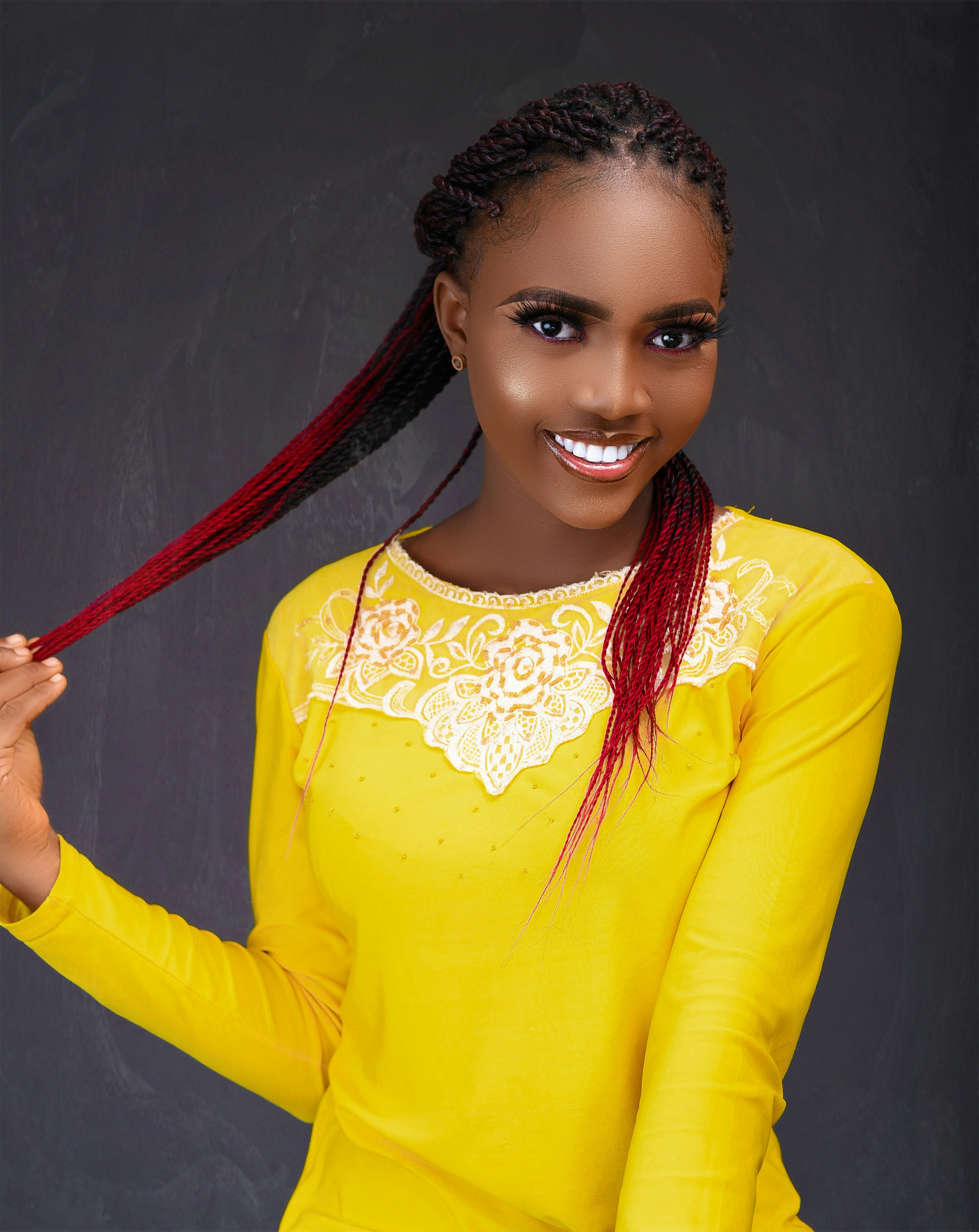 A woman in a yellow dress with a red braid photo – Free Clothing Image ...