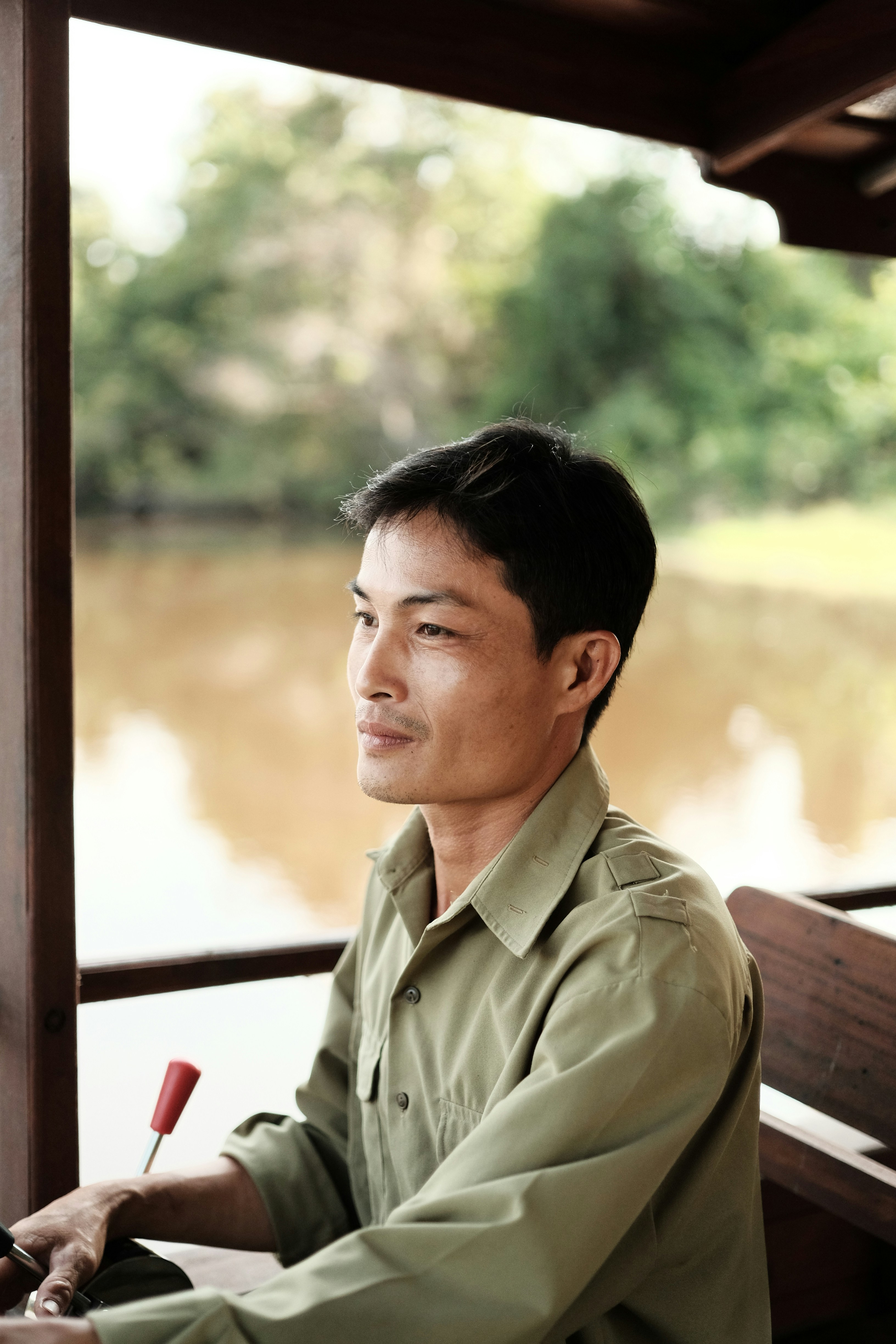 Soft Light, Quiet Contemplation Aboard a Wooden Boat
