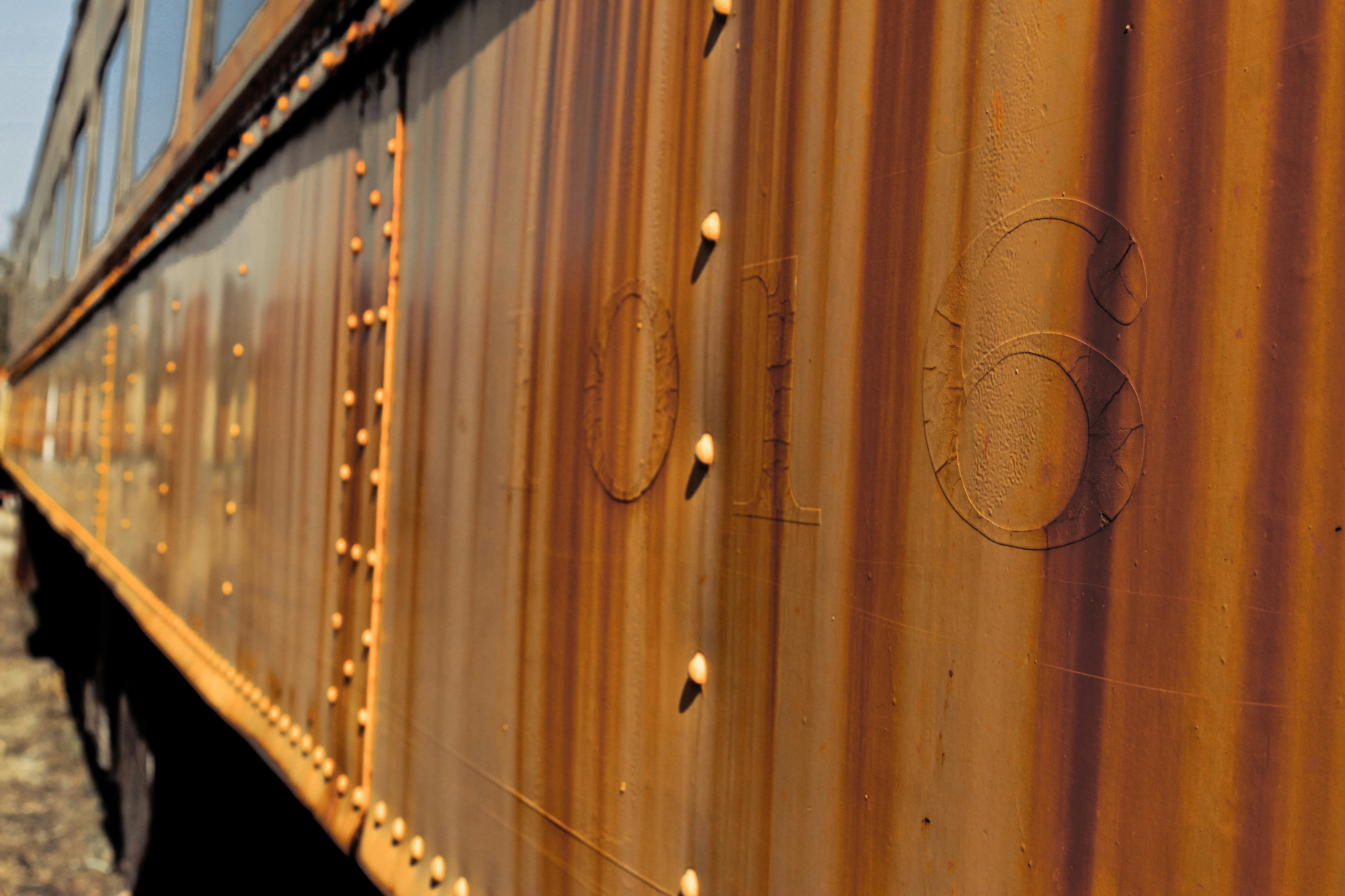 A close up of the side of a train car photo – Free Brown Image on Unsplash