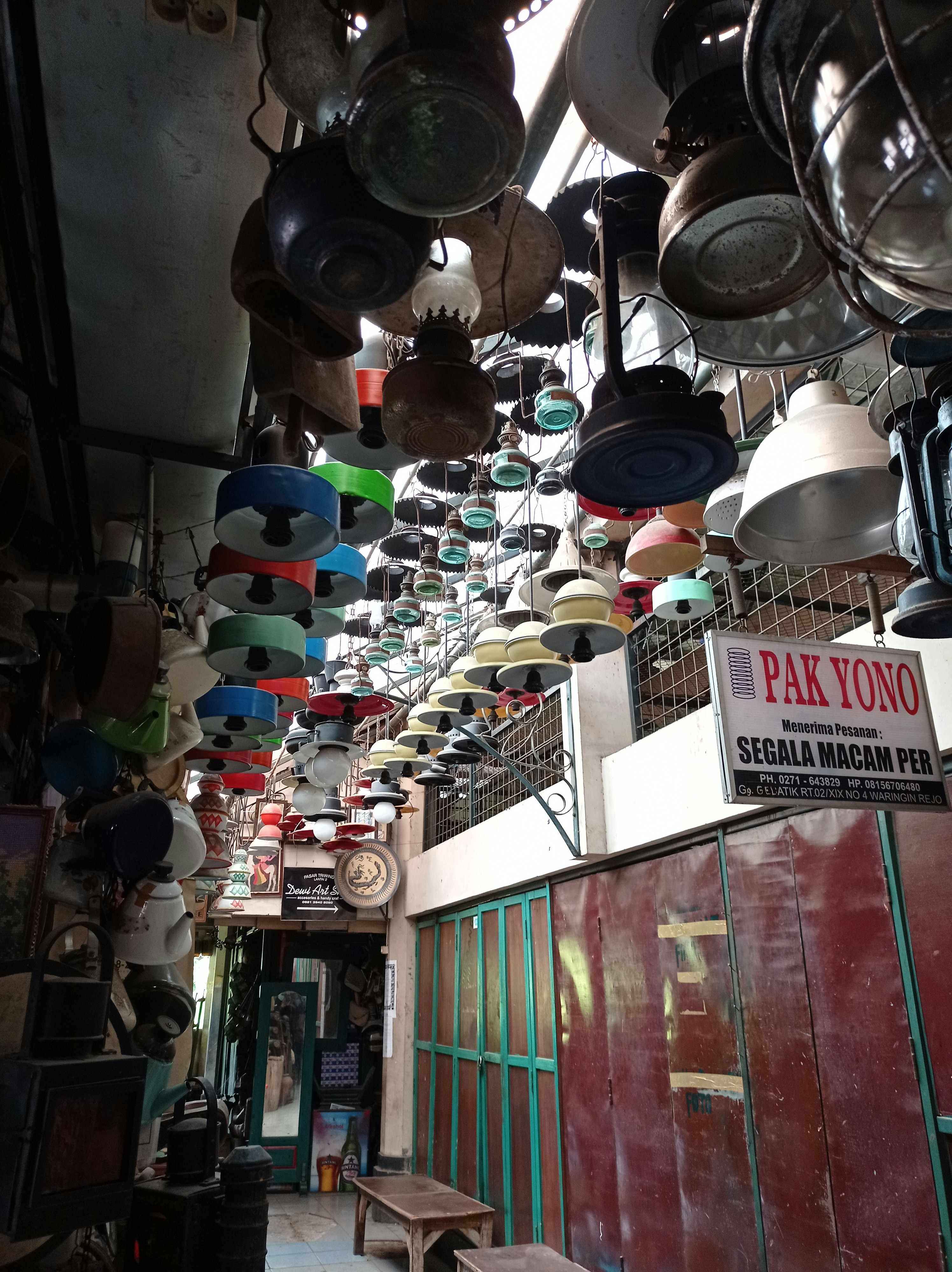 A room filled with lots of different types of pans photo – Free City ...