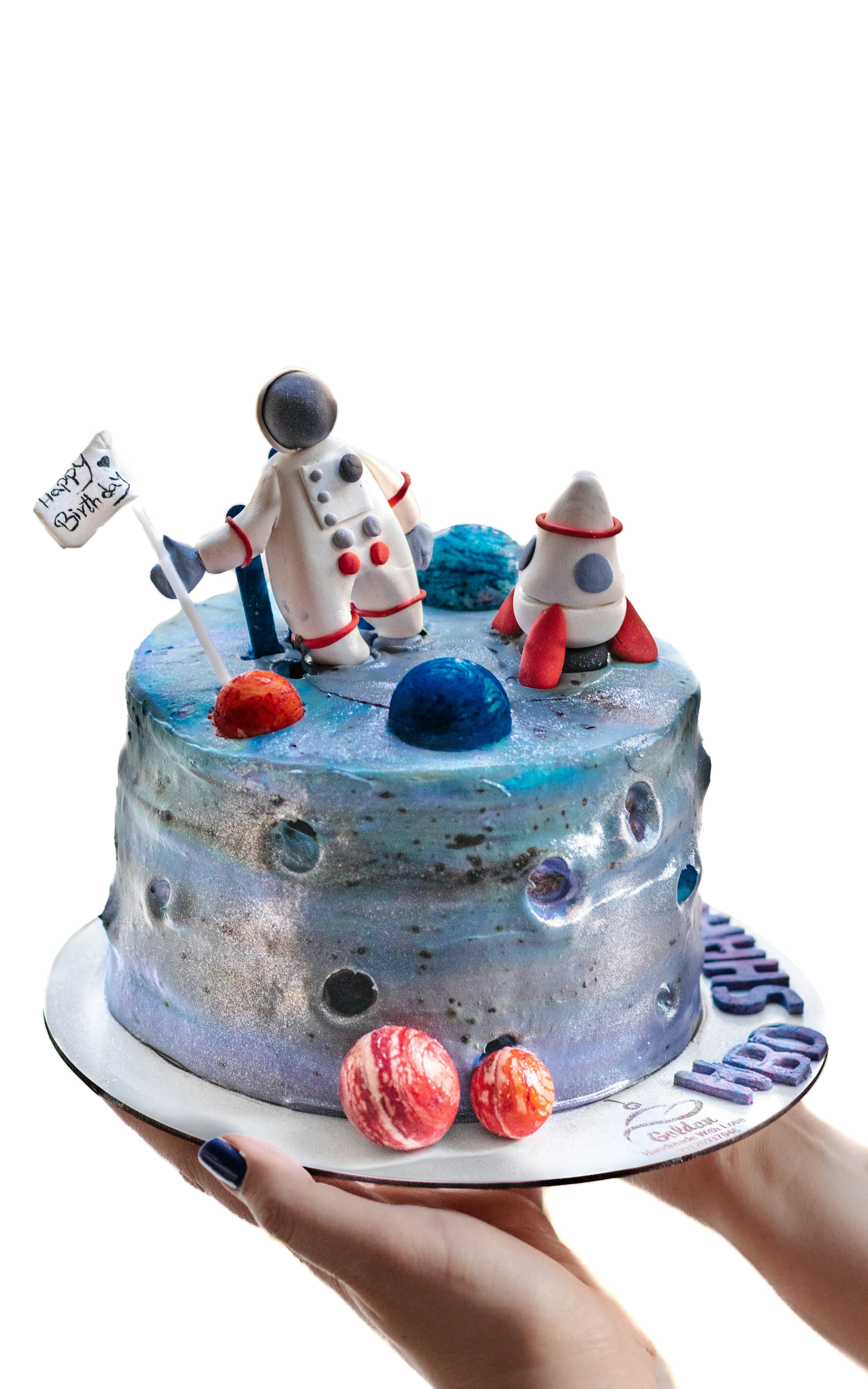 Cosmic Birthday Cake: Tiny Astronauts on a Galaxy Frosting