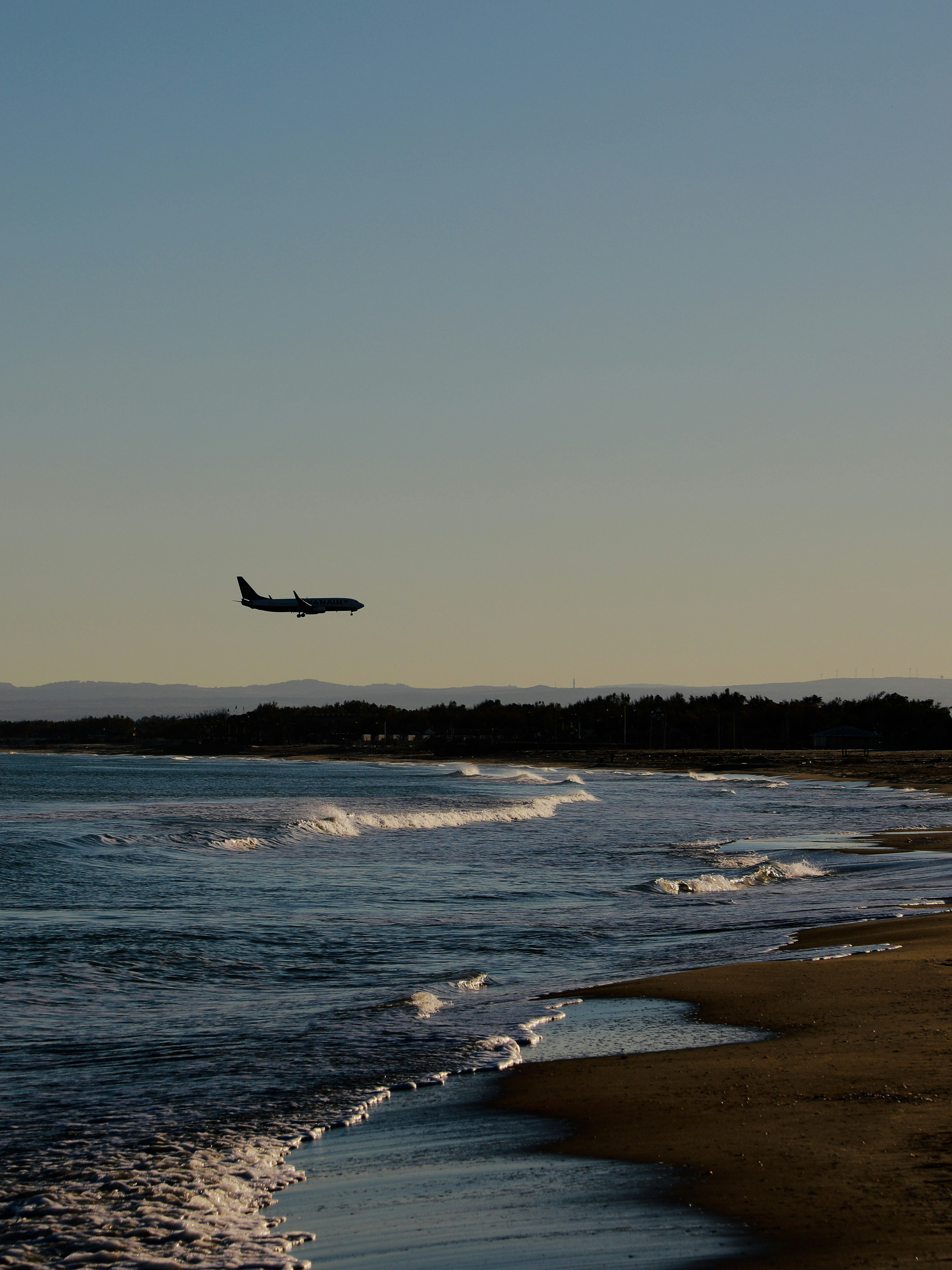 Jet on a Quiet Horizon at Golden Hour