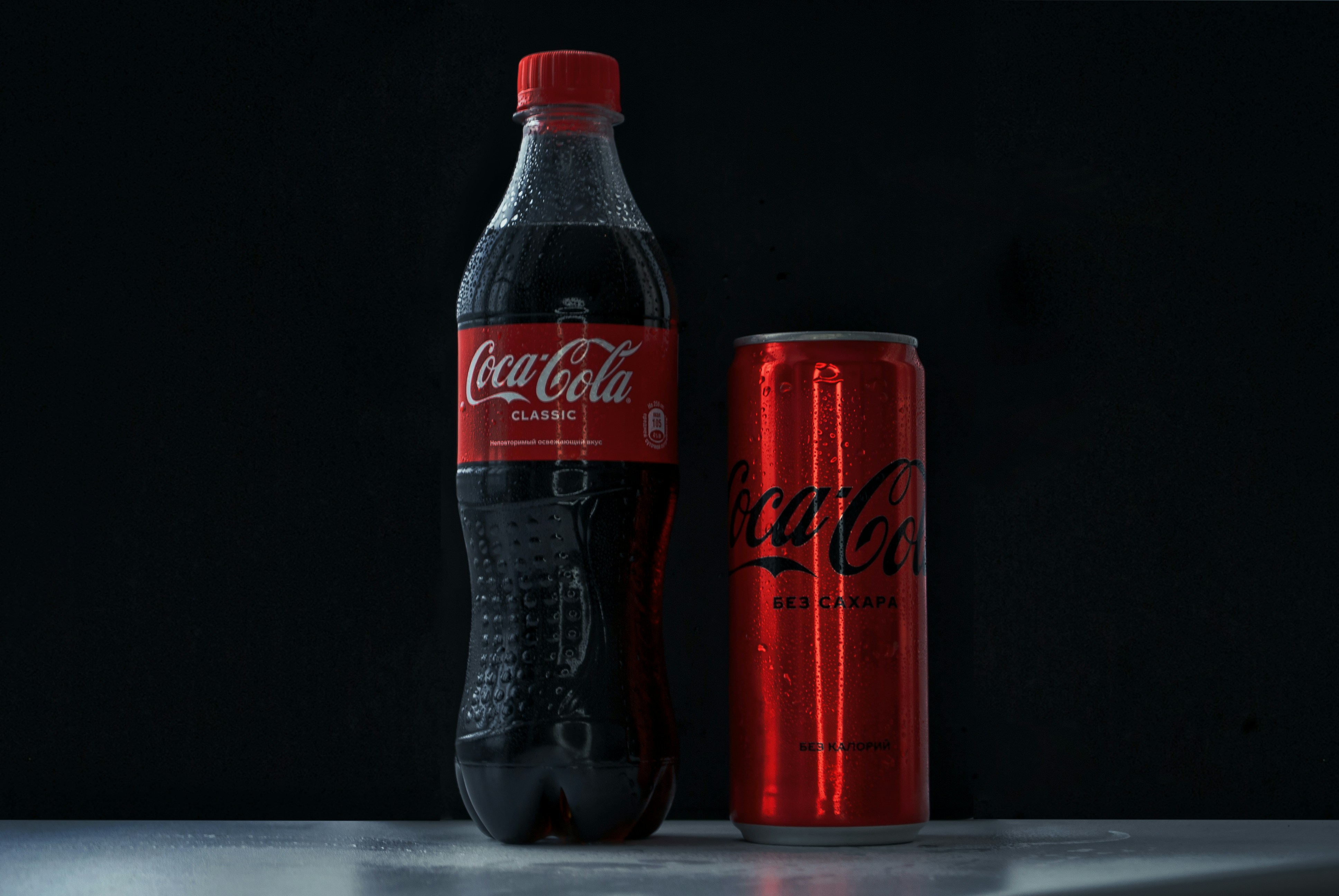 A can of coca cola next to a can of coke photo – Free Beverage Image on ...