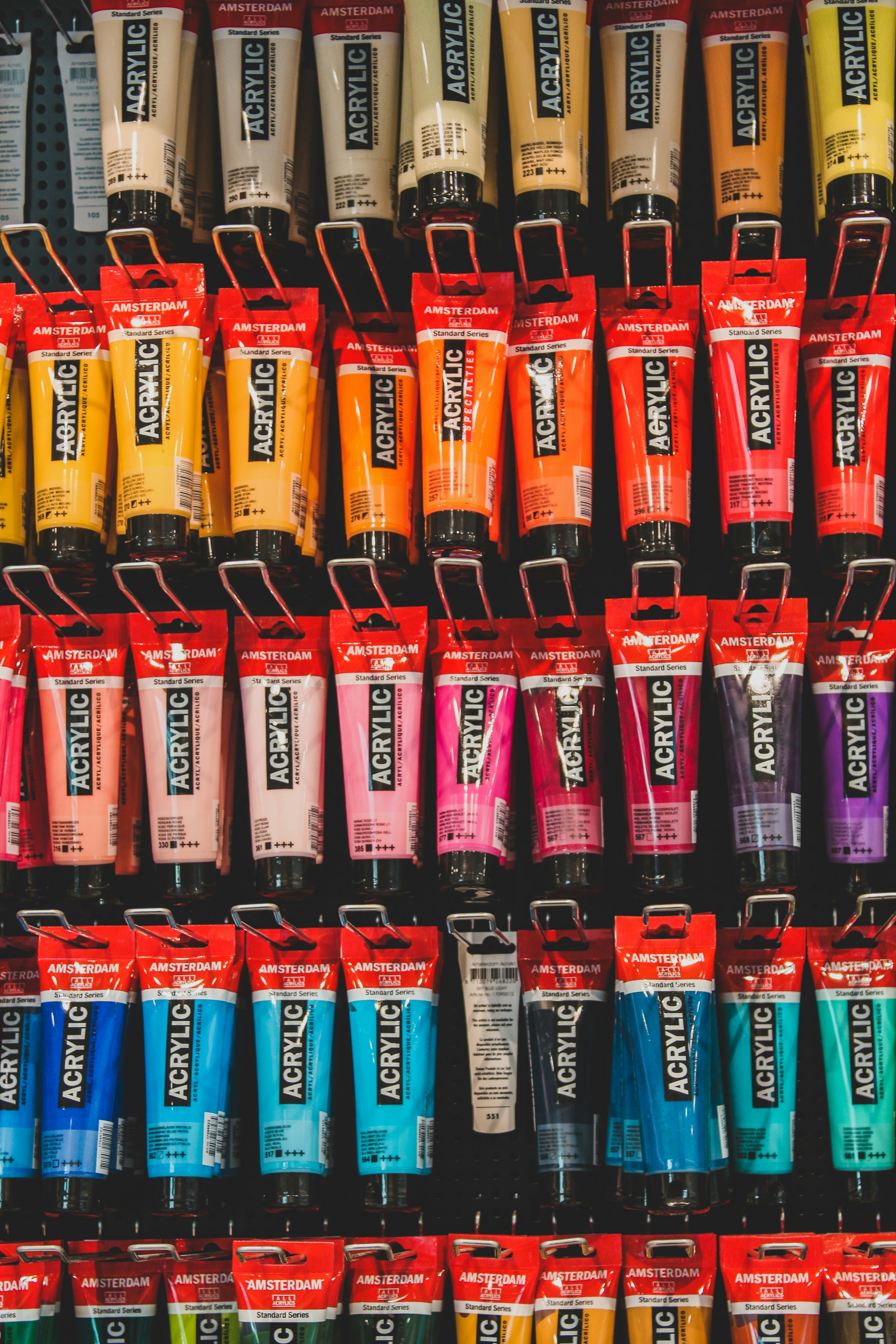 A display of many different colors of toothpaste photo – Free Boston ...
