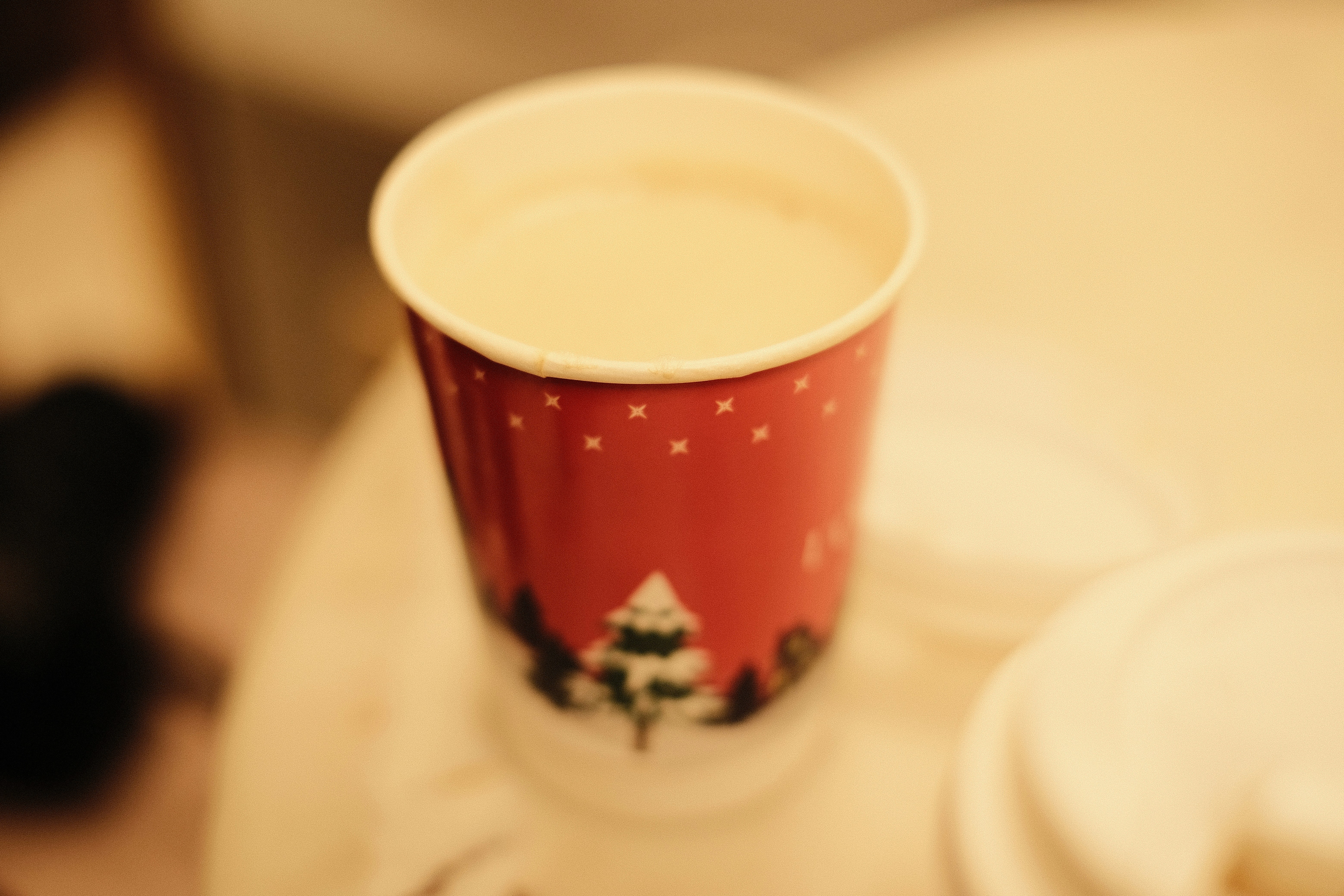 Soft-Glow Christmas Cup on a Quiet Table