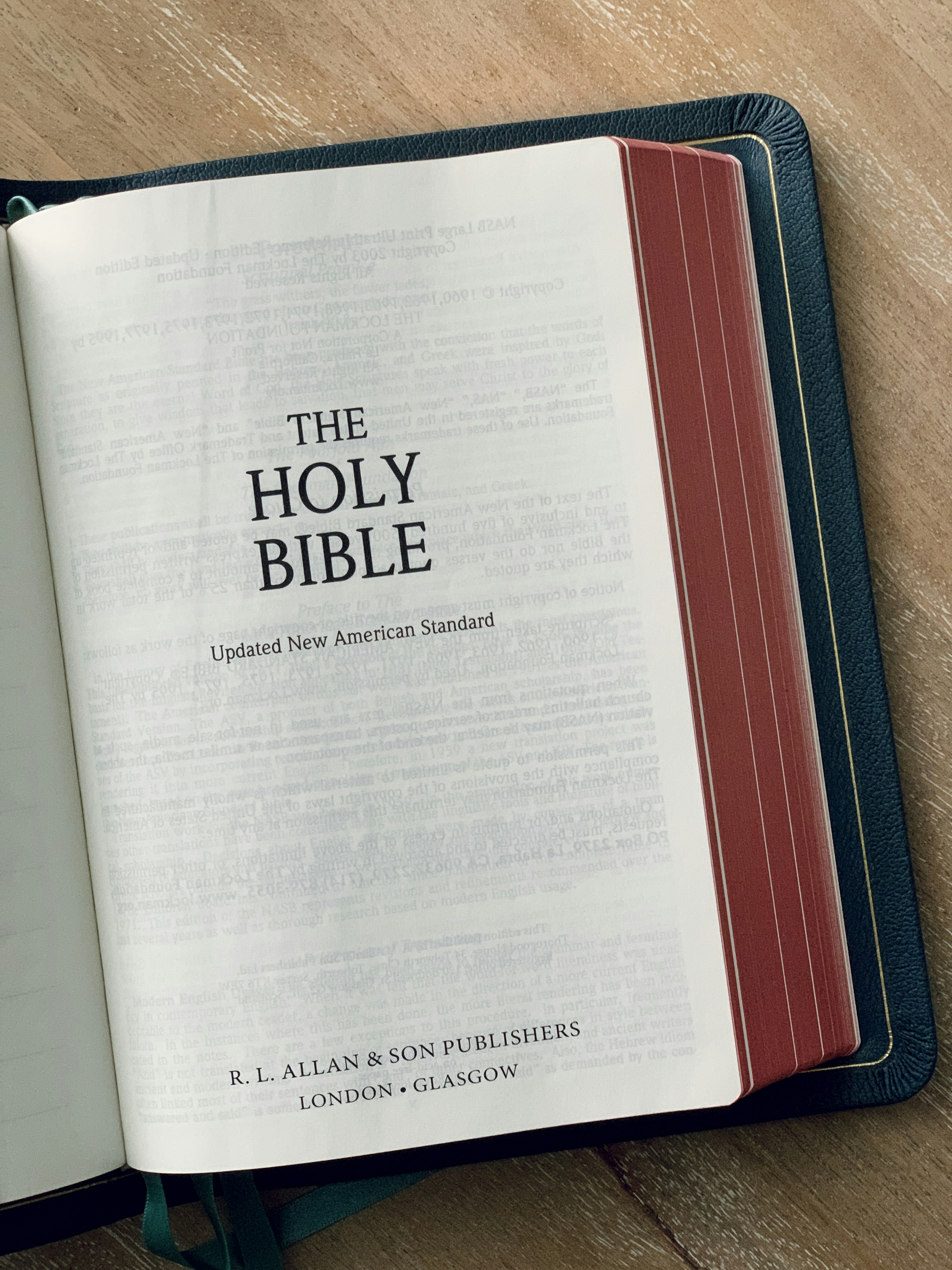 An open bible on a wooden table photo – Free Religion Image on Unsplash