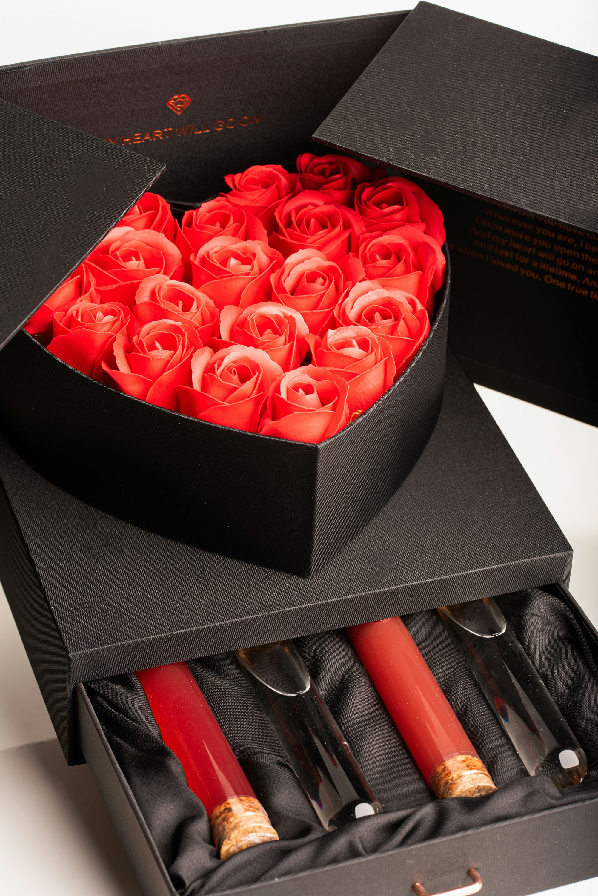 A black box with red roses inside of it photo – Free Red Image on Unsplash