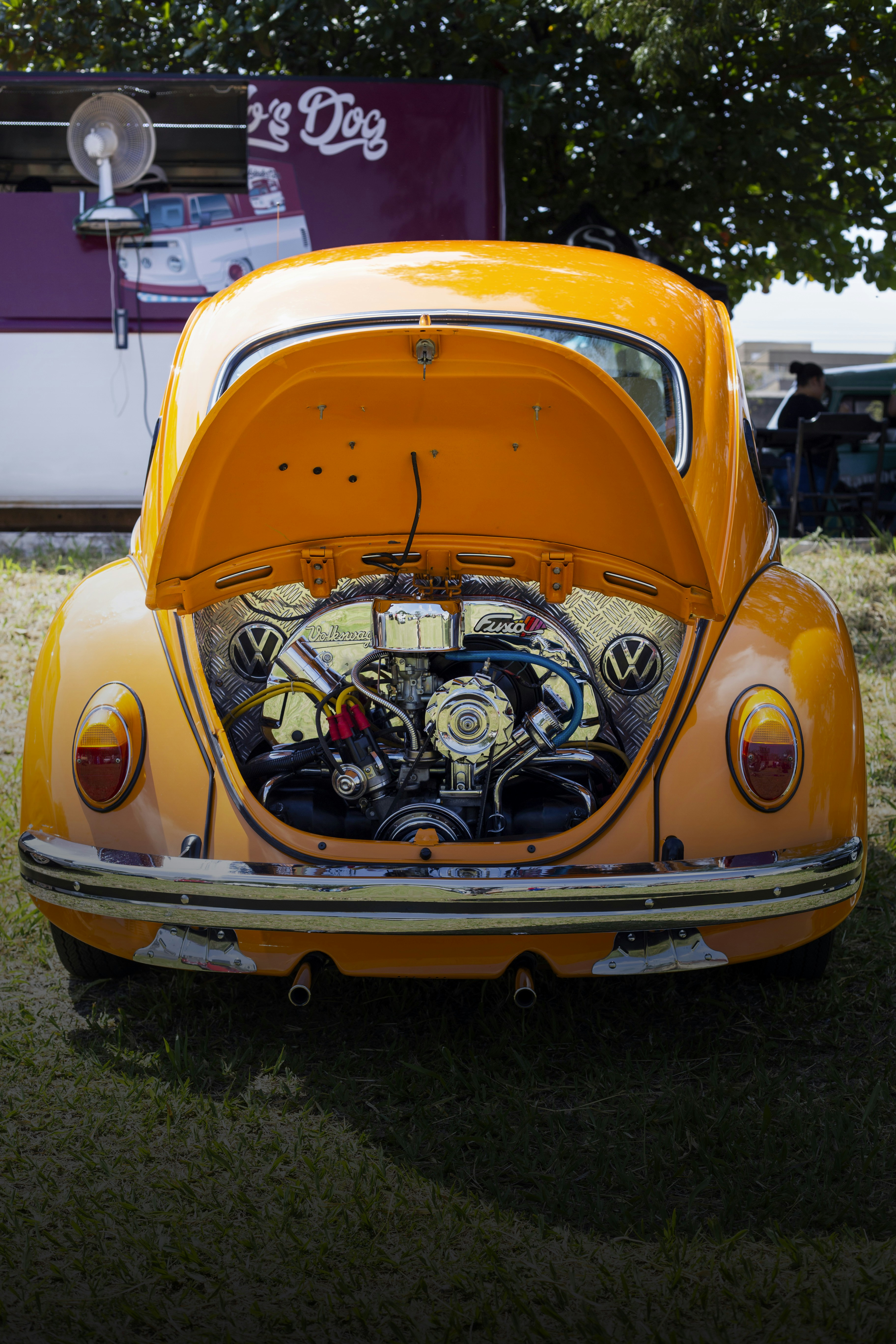 A yellow vw bug with a engine in the trunk photo – Free Brown Image on ...